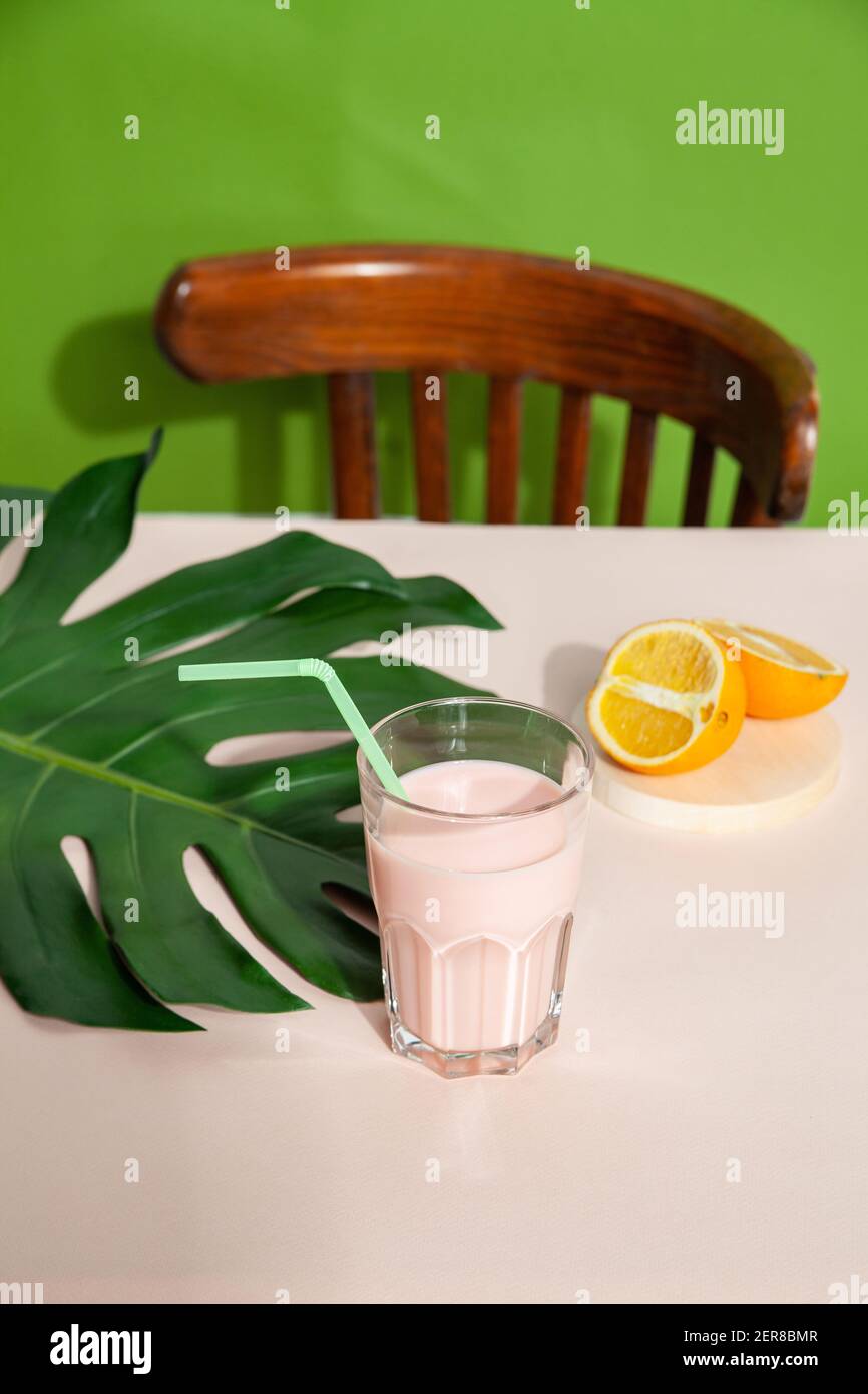 Healthy smoothie and fruits on table in studio Stock Photo - Alamy