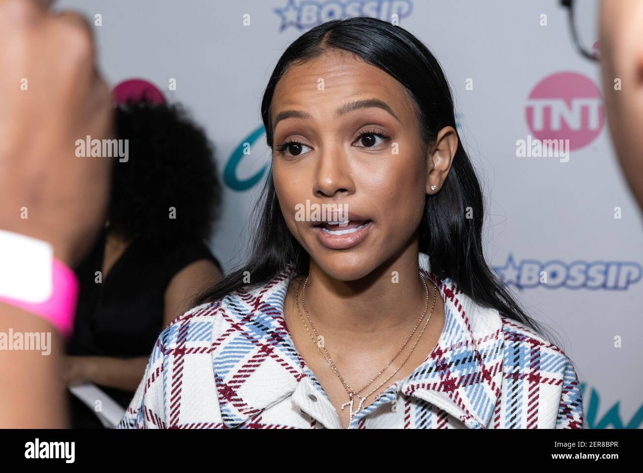 "Claws" cast member Karrueche Tran talks to reporters at the season two ...