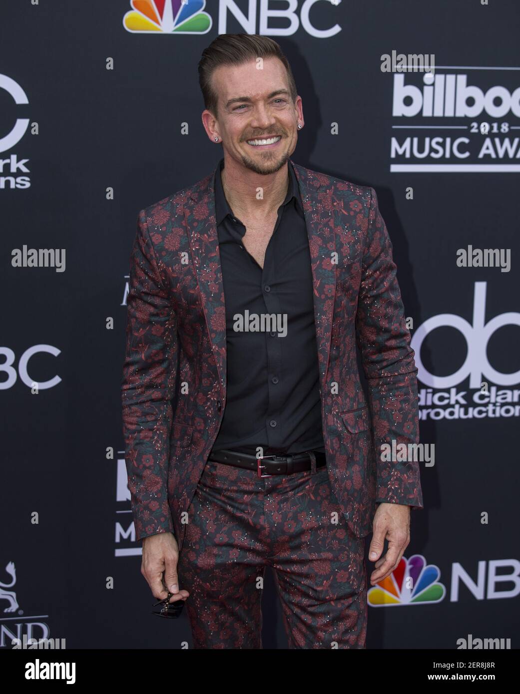 Damon Sharpe walking on the red carpet at the 2018 Billboard Music ...