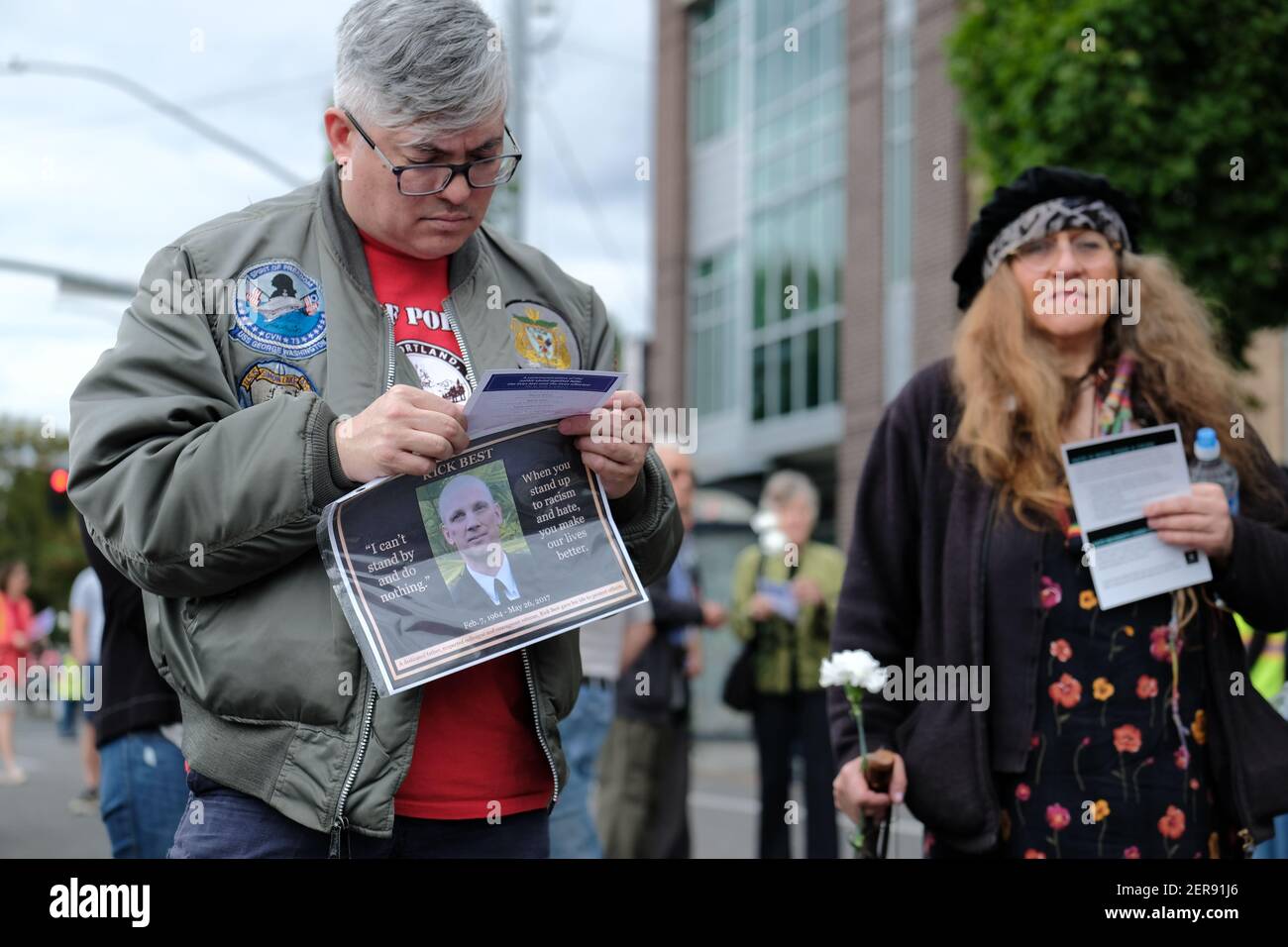 People gather at the Hollywood Transit Center in Portland, Ore., on May ...