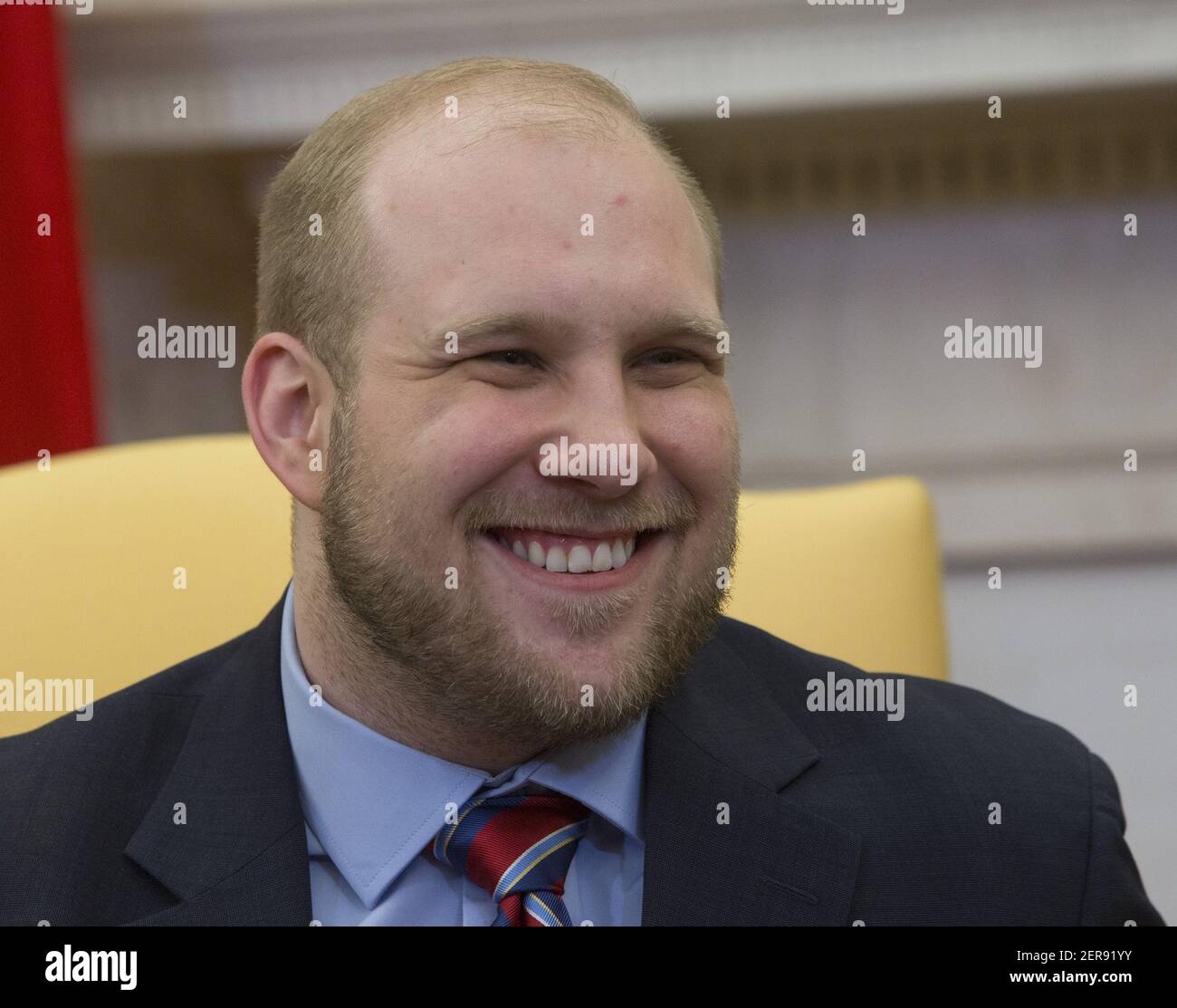 Joshua Holt smiles during a meeting with U.S. President Donald Trump ...