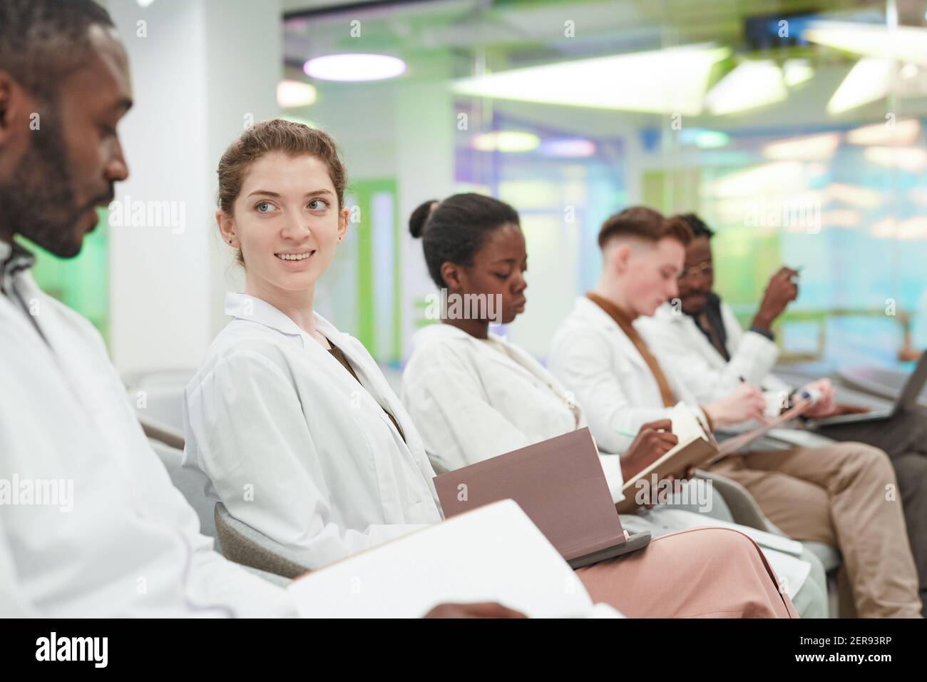 Row of lab coats hi-res stock photography and images - Alamy