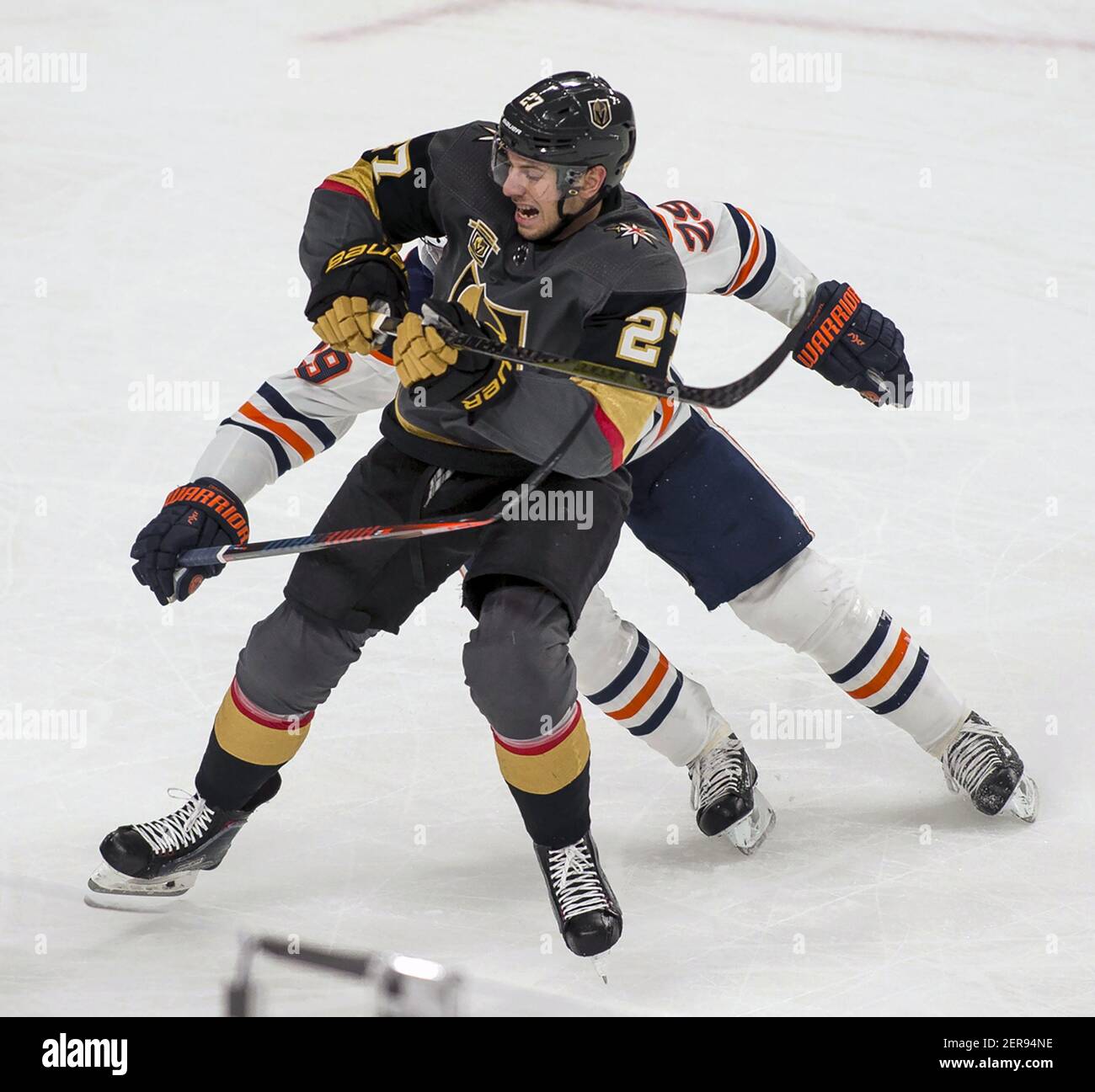 Vegas Golden Knights defenseman Shea Theodore (27) catches a stick from ...