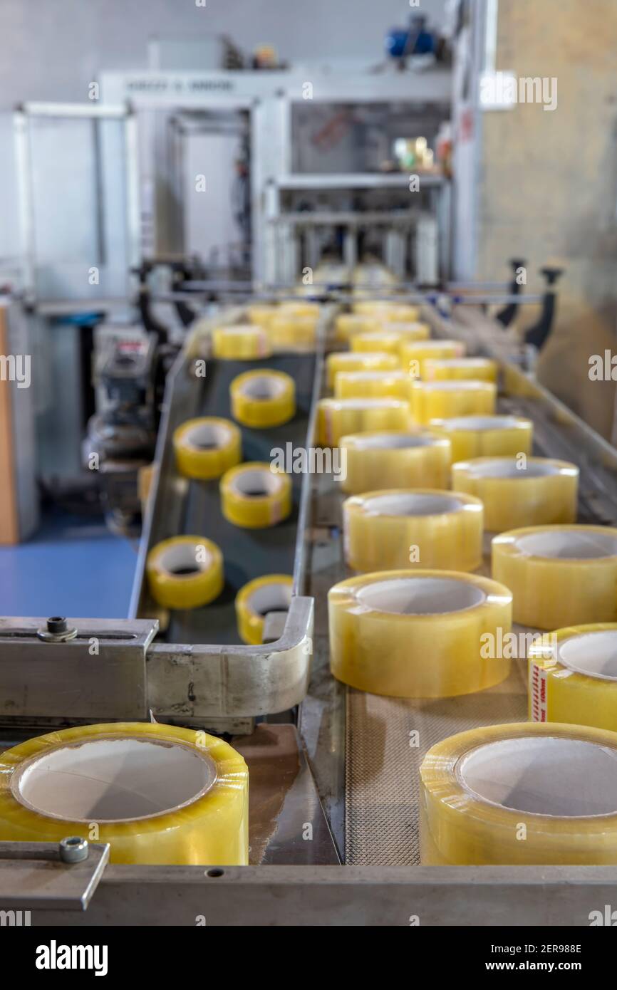 Packing tape factory. Production of duct tape. Strapping Machine for ...