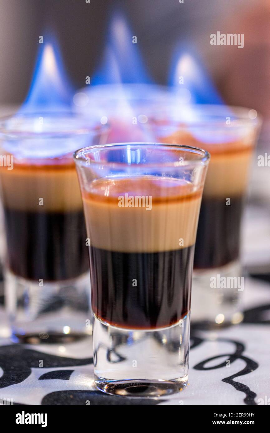 Flaming drink. Cocktails with a lit fire Stock Photo - Alamy