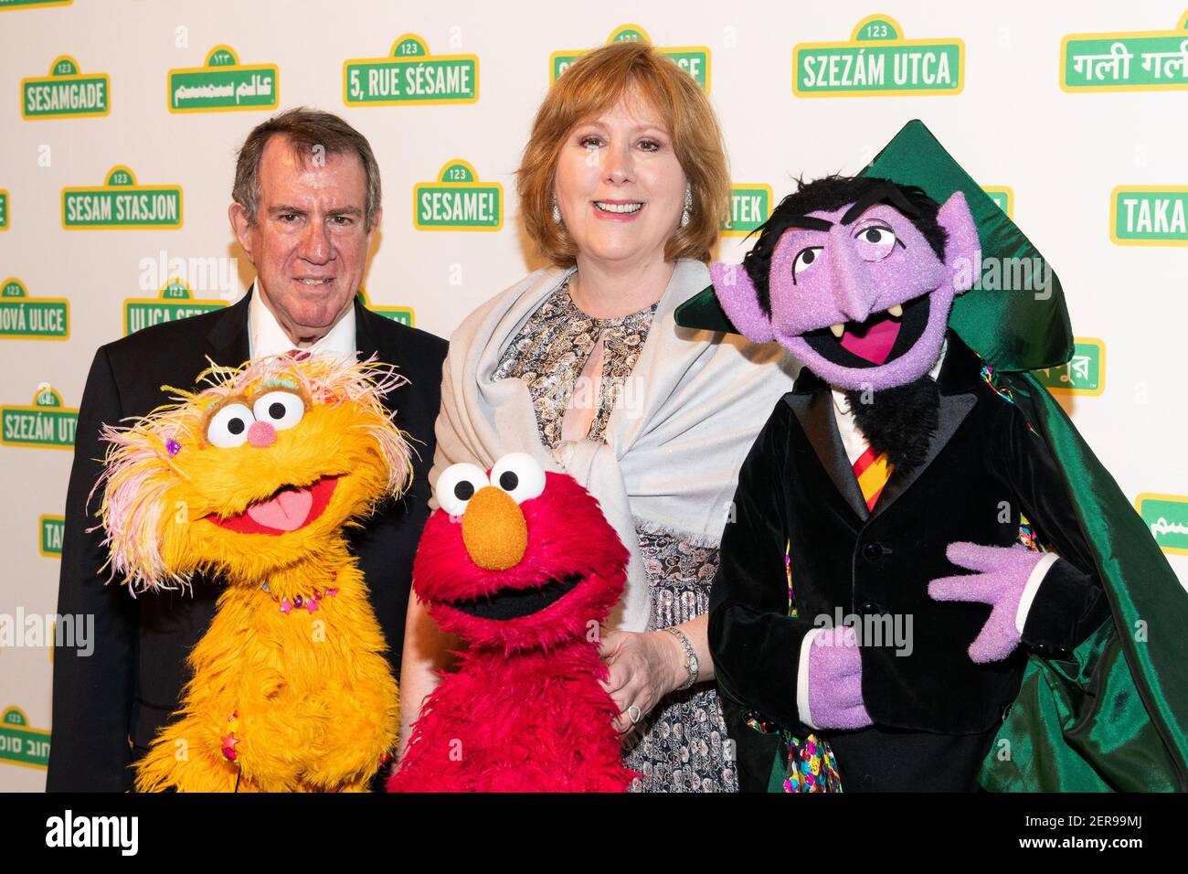 Ann and Andrew Tisch with Zoe, Elmo and The Count at the Sesame ...