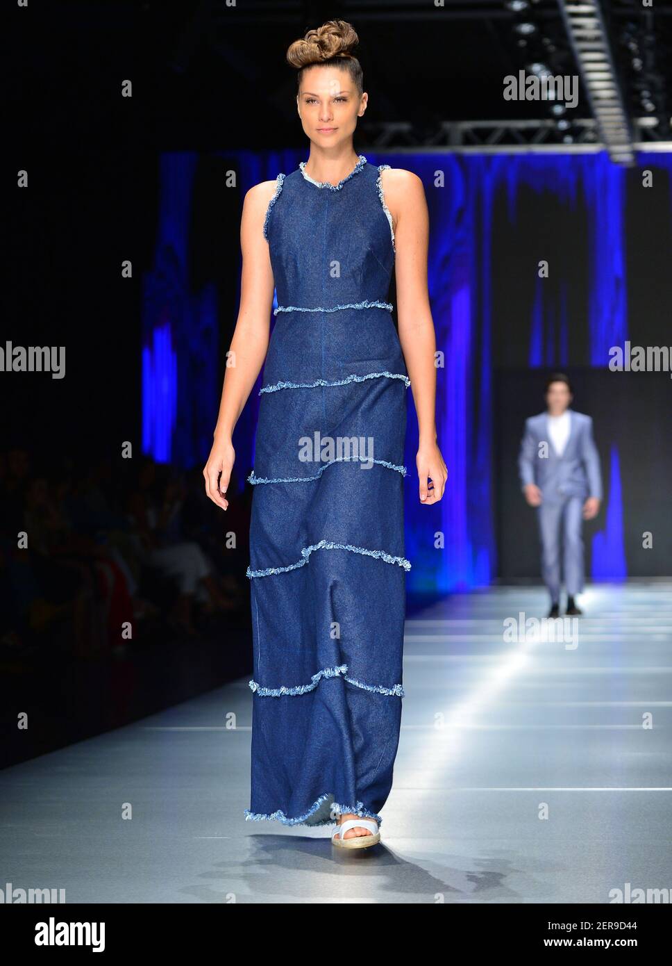A model walks the runway at the Rene Ruiz fashion show during The Miami ...
