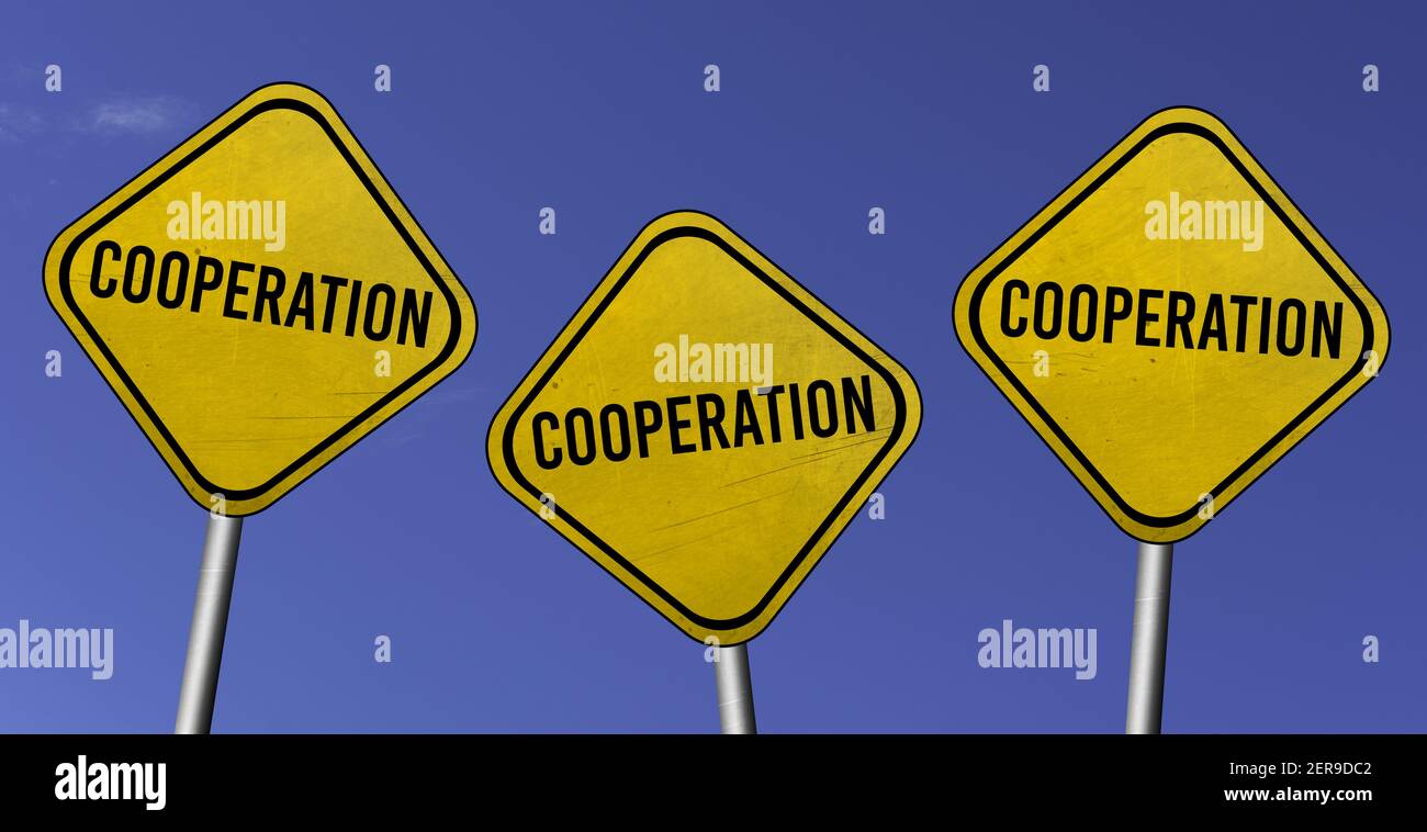 Cooperation Sea - three yellow signs with blue sky background Stock ...
