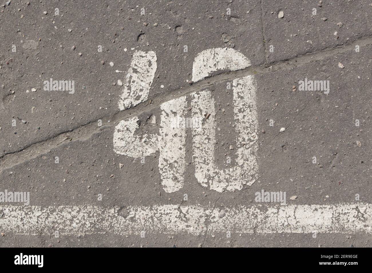Number 40, forty, painted on asphalt, running track Stock Photo - Alamy