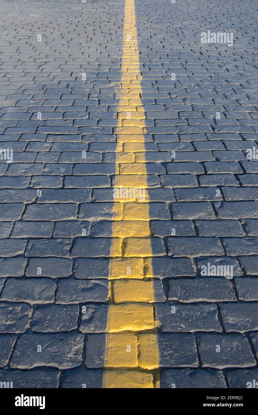 Pavement background, cobblestone with yellow line, markup, perspective ...