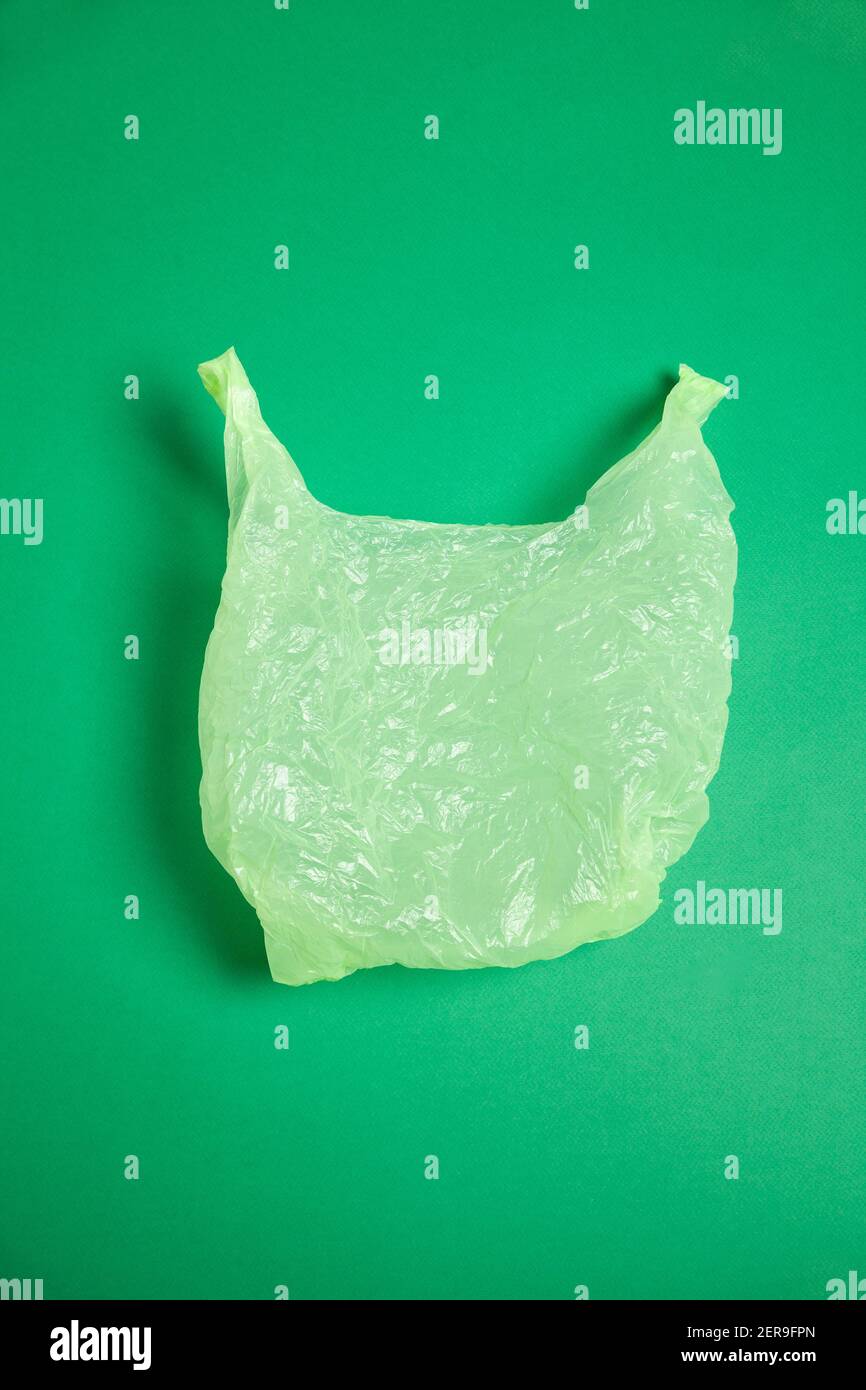 Green plastic bag placed hi-res stock photography and images - Alamy