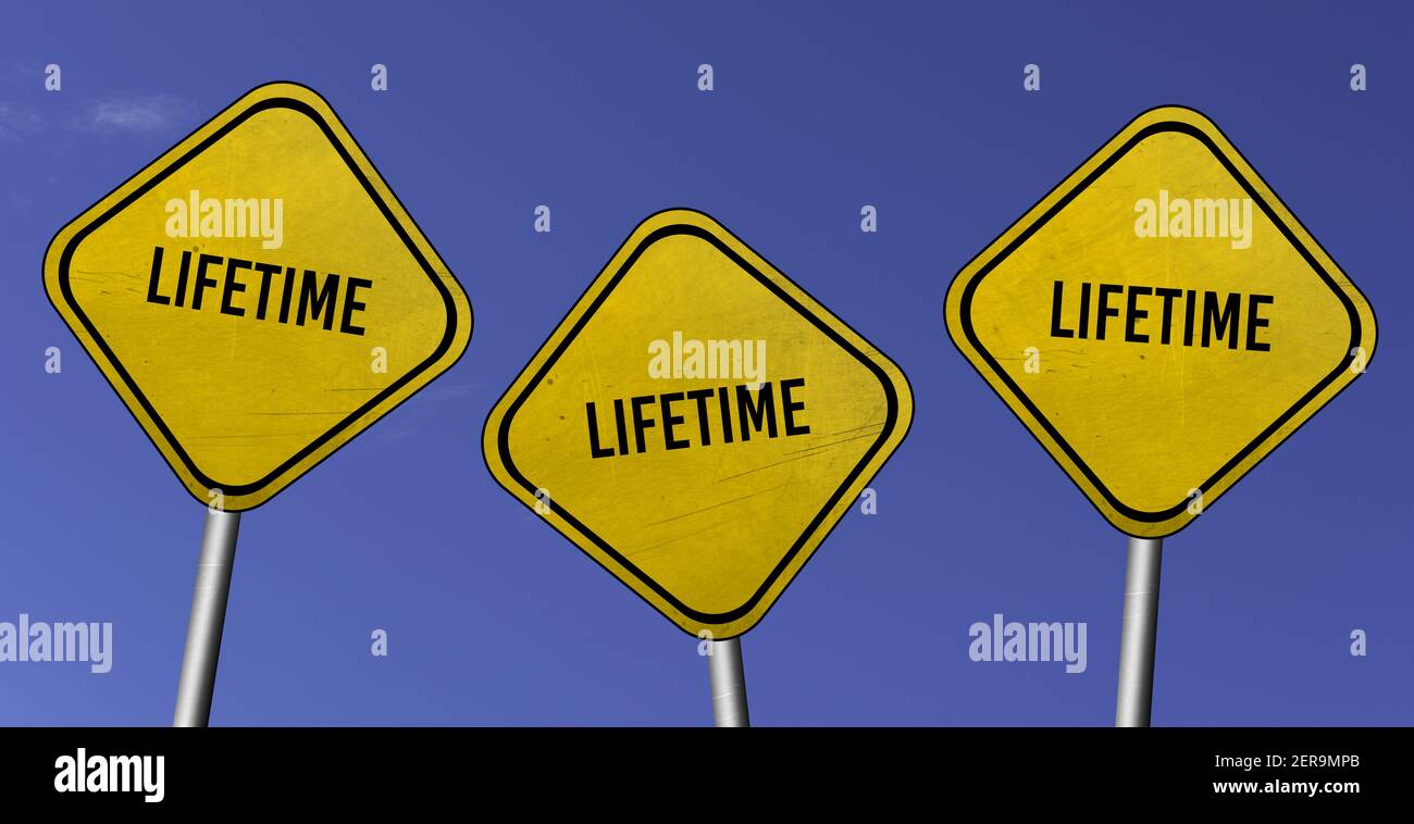 Lifetime - three yellow signs with blue sky background Stock Photo - Alamy