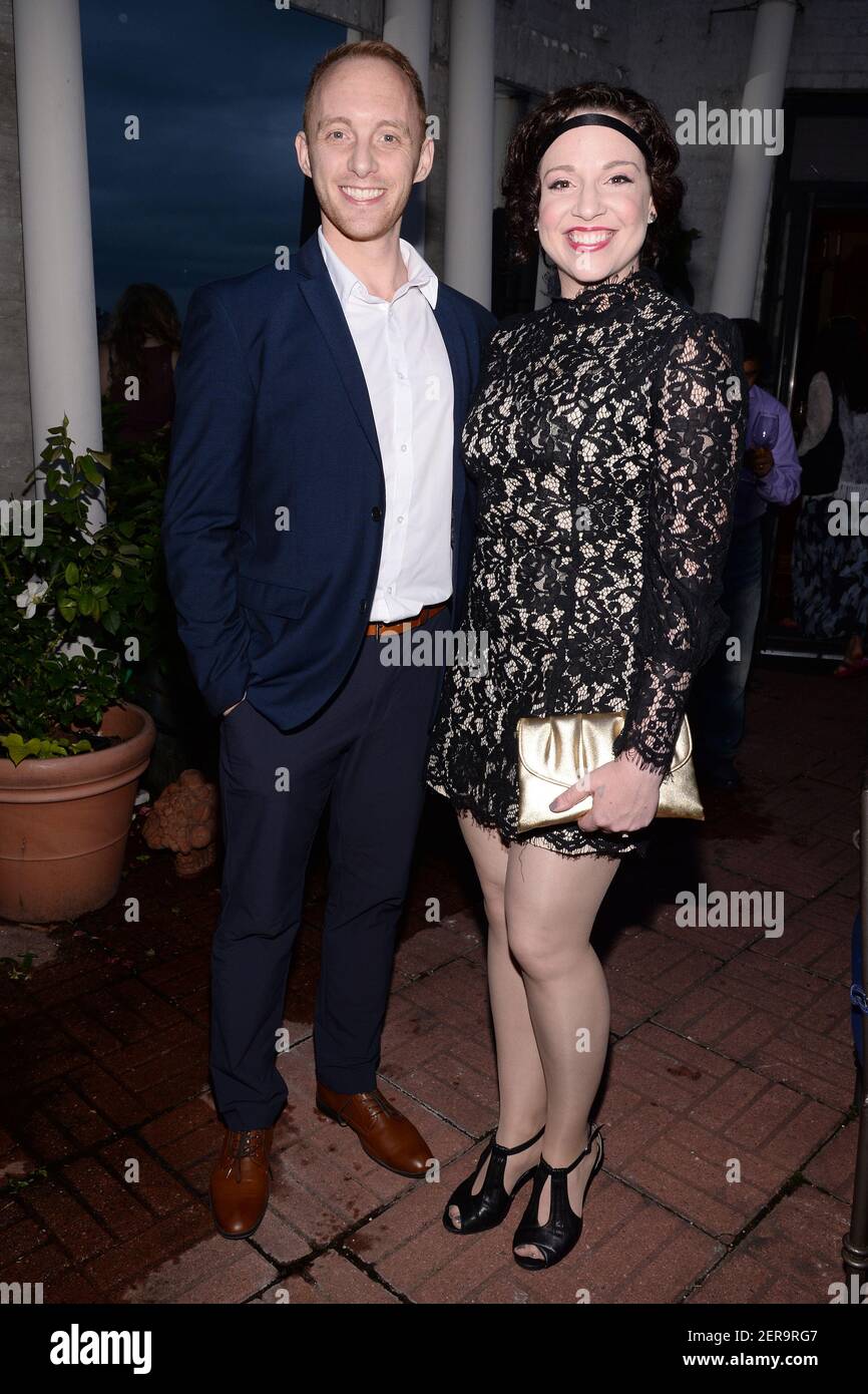 (L-R) Actor Benjamin Farmer and Megan Carver attend the reception for ...