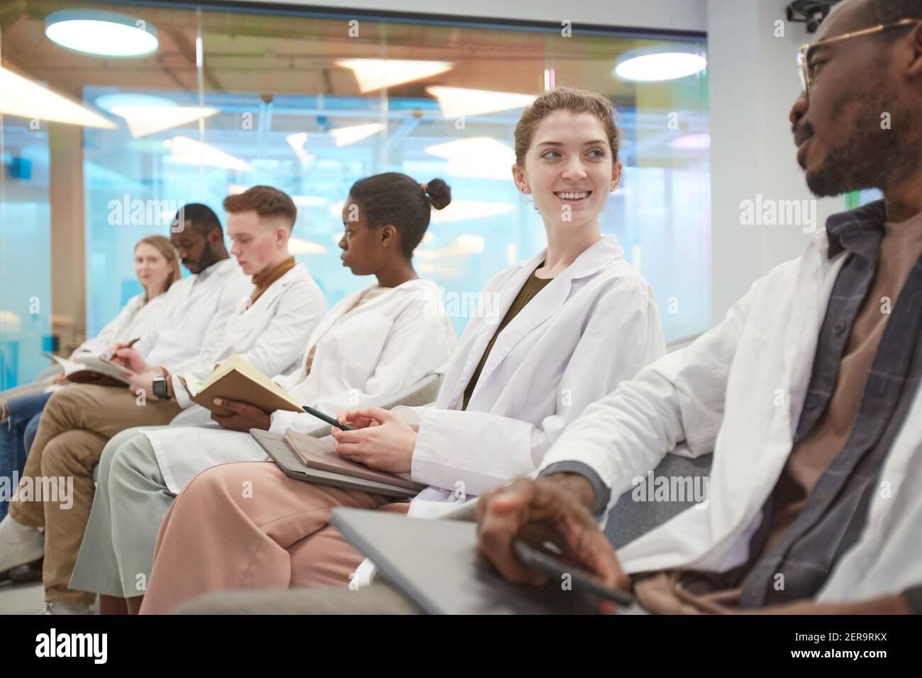 Row of lab coats hi-res stock photography and images - Alamy