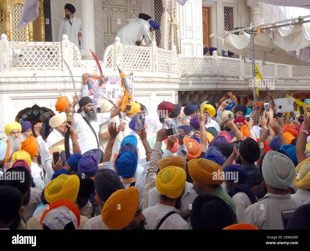 AMRITSAR, INDIA - JUNE 6: Sikh hardliners gathered around the Akal ...