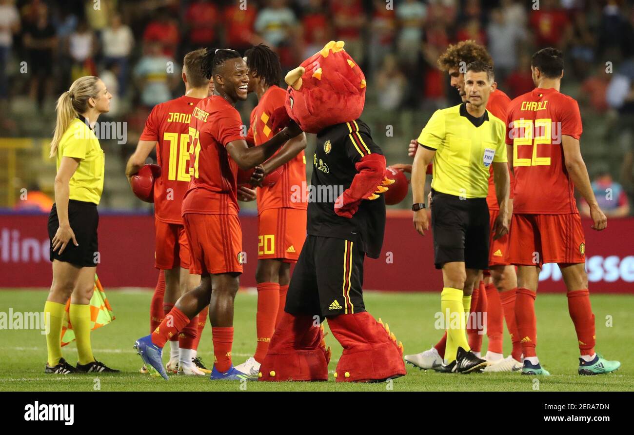 Players celebrate after winning a friendly game between Belgium and ...