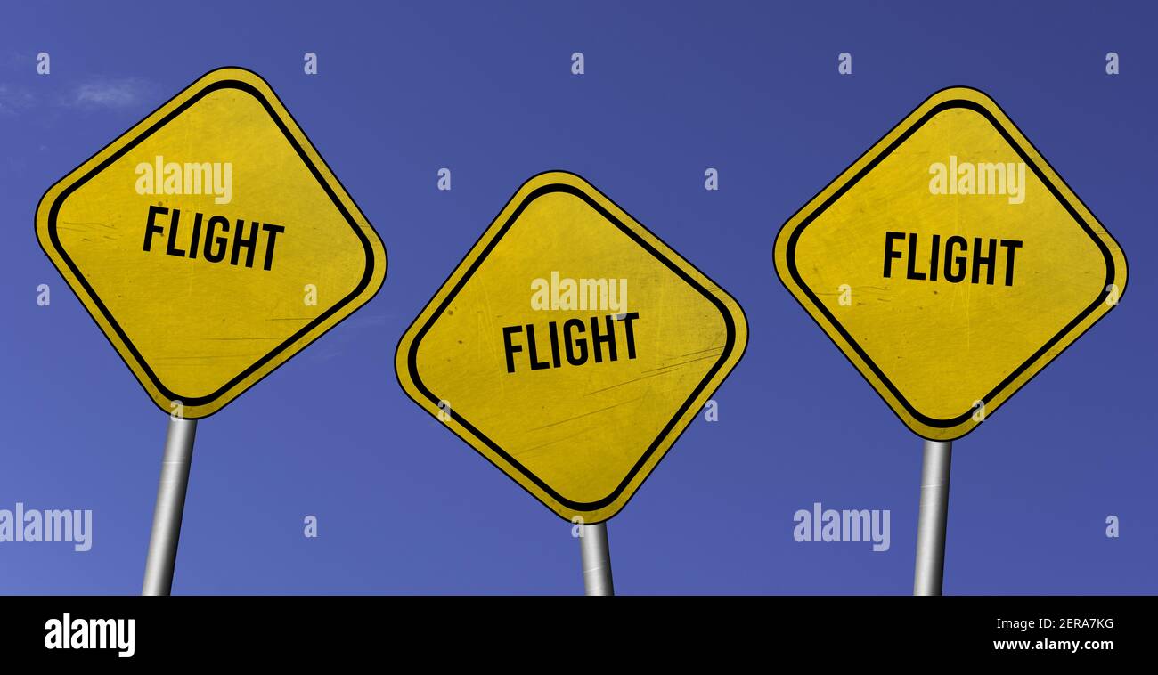 flight - three yellow signs with blue sky background Stock Photo - Alamy