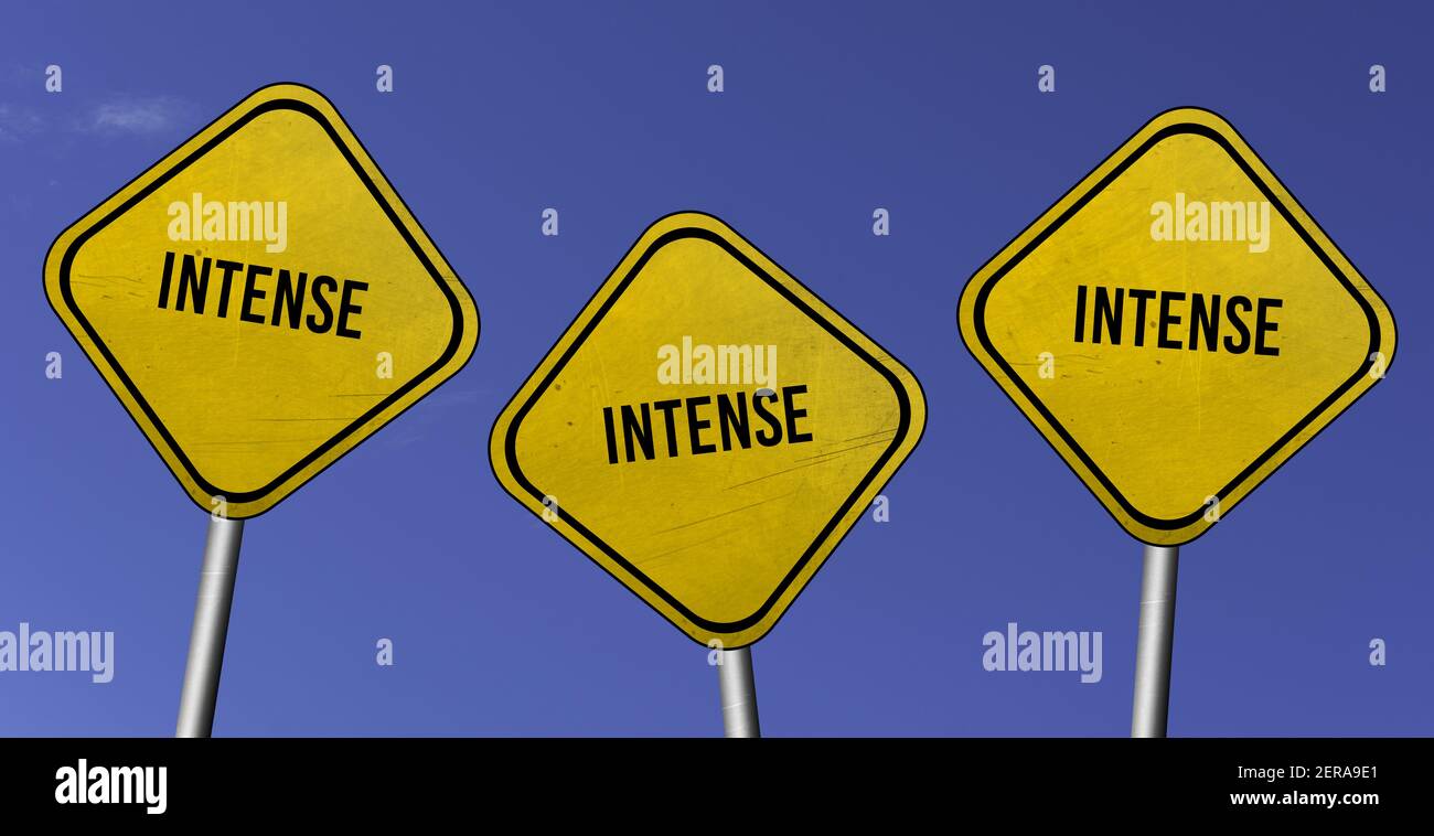 intense - three yellow signs with blue sky background Stock Photo - Alamy