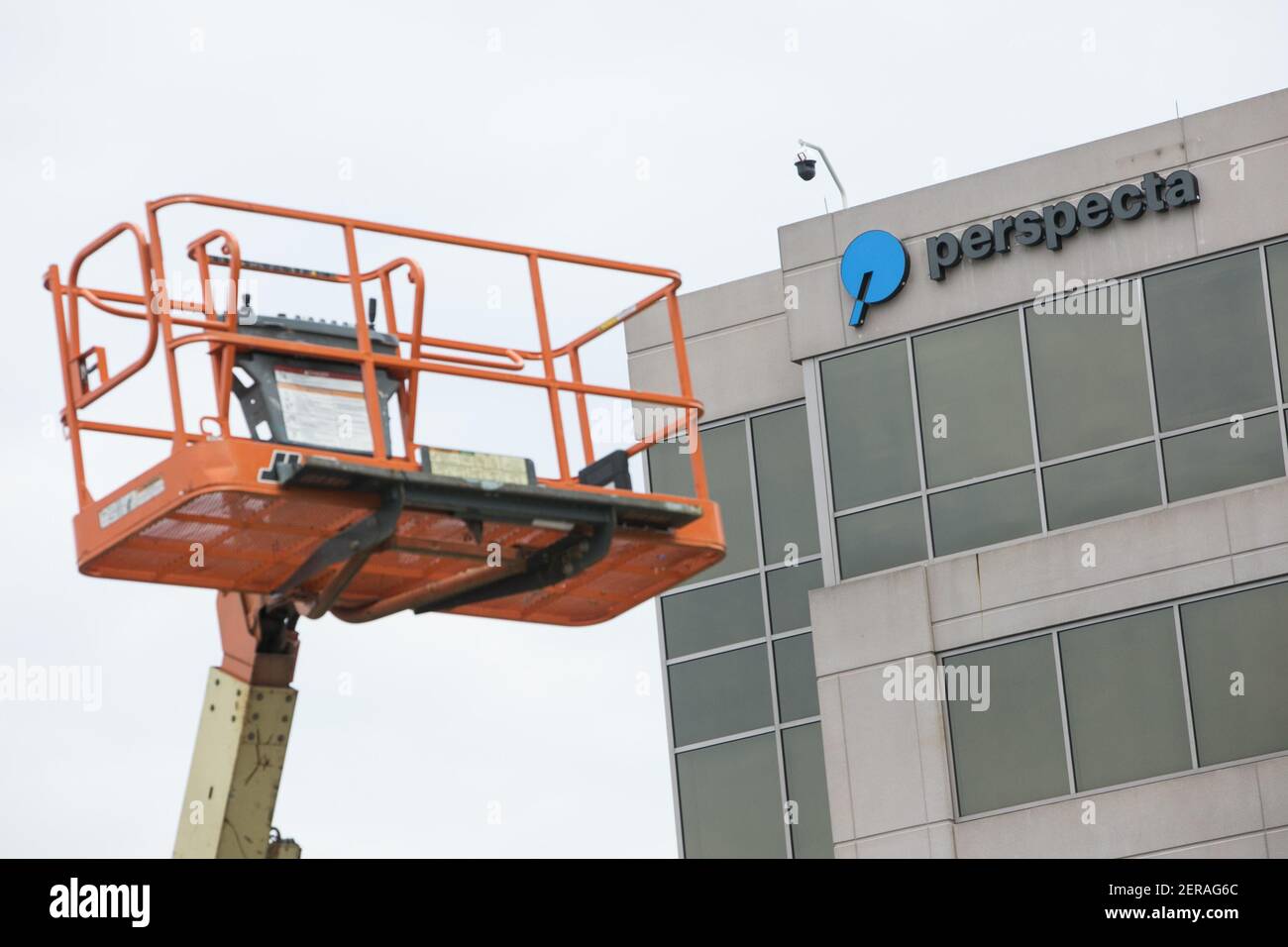 A logo sign outside of a facility occupied by Perspecta in Chantilly ...