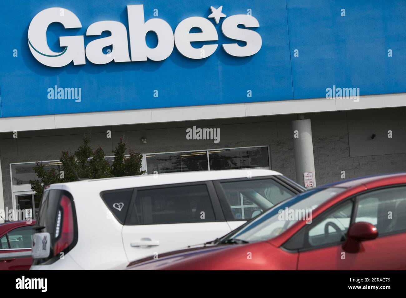 A logo sign outside of a Gabe's retail store in Fredericksburg ...