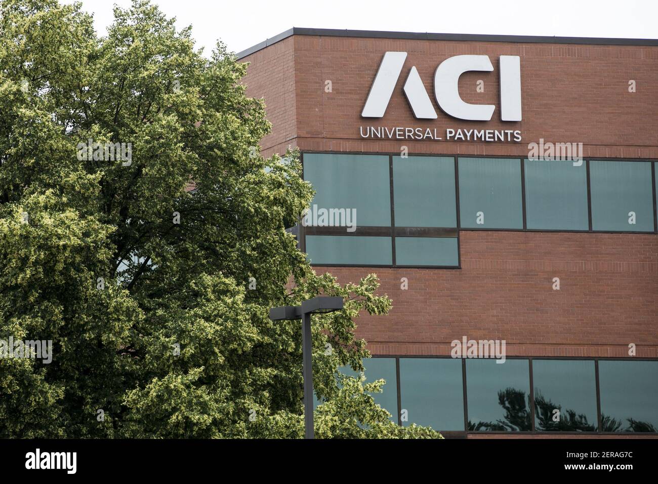 A logo sign outside of a facility occupied by ACI Worldwide Inc., in ...