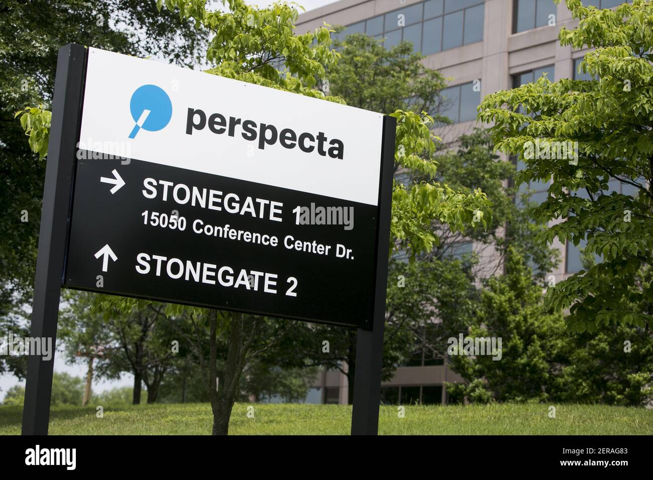 A logo sign outside of a facility occupied by Perspecta in Chantilly ...