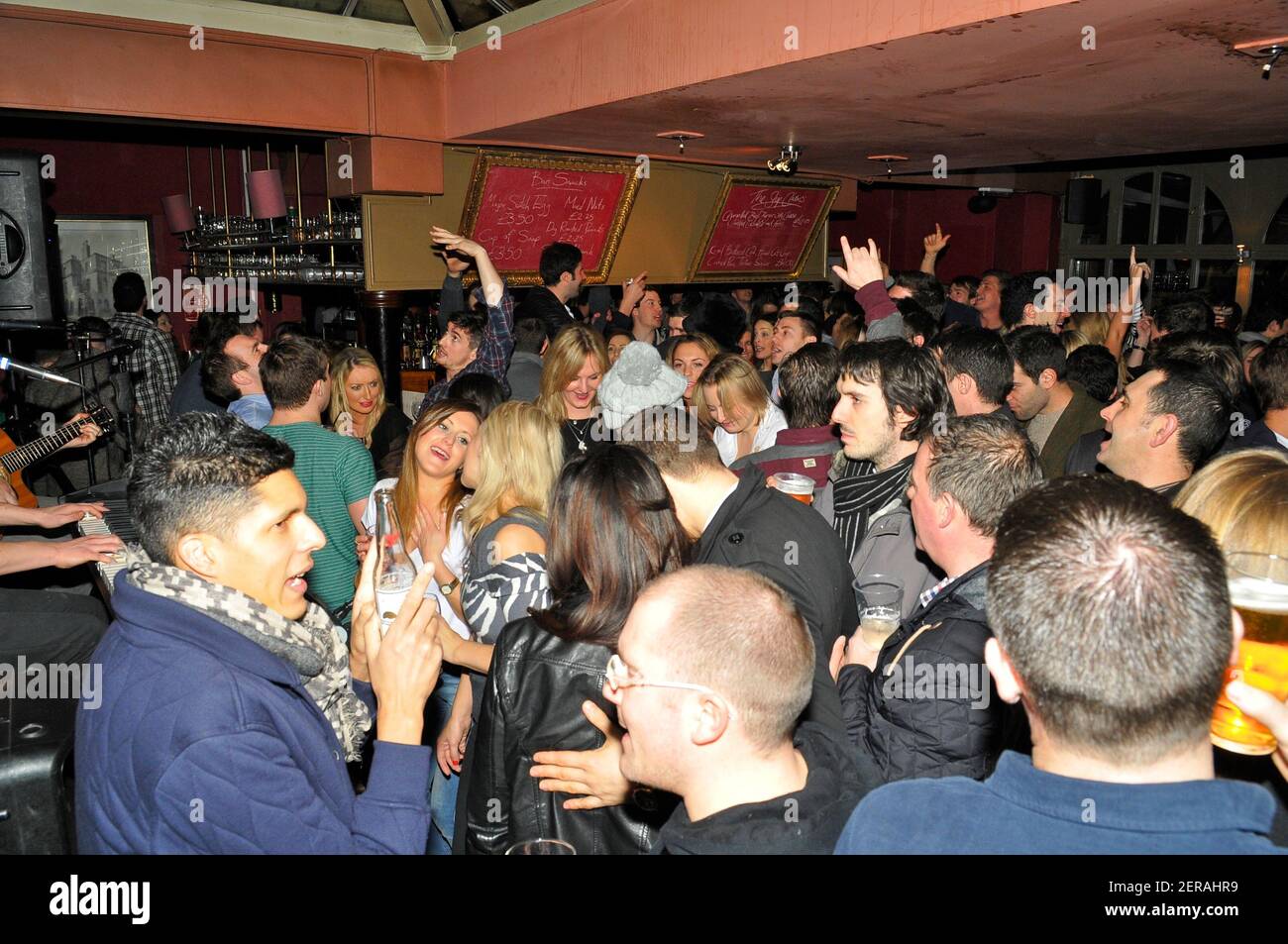 A crowd of people at The Ship pub, Wandsworth, London Stock Photo - Alamy