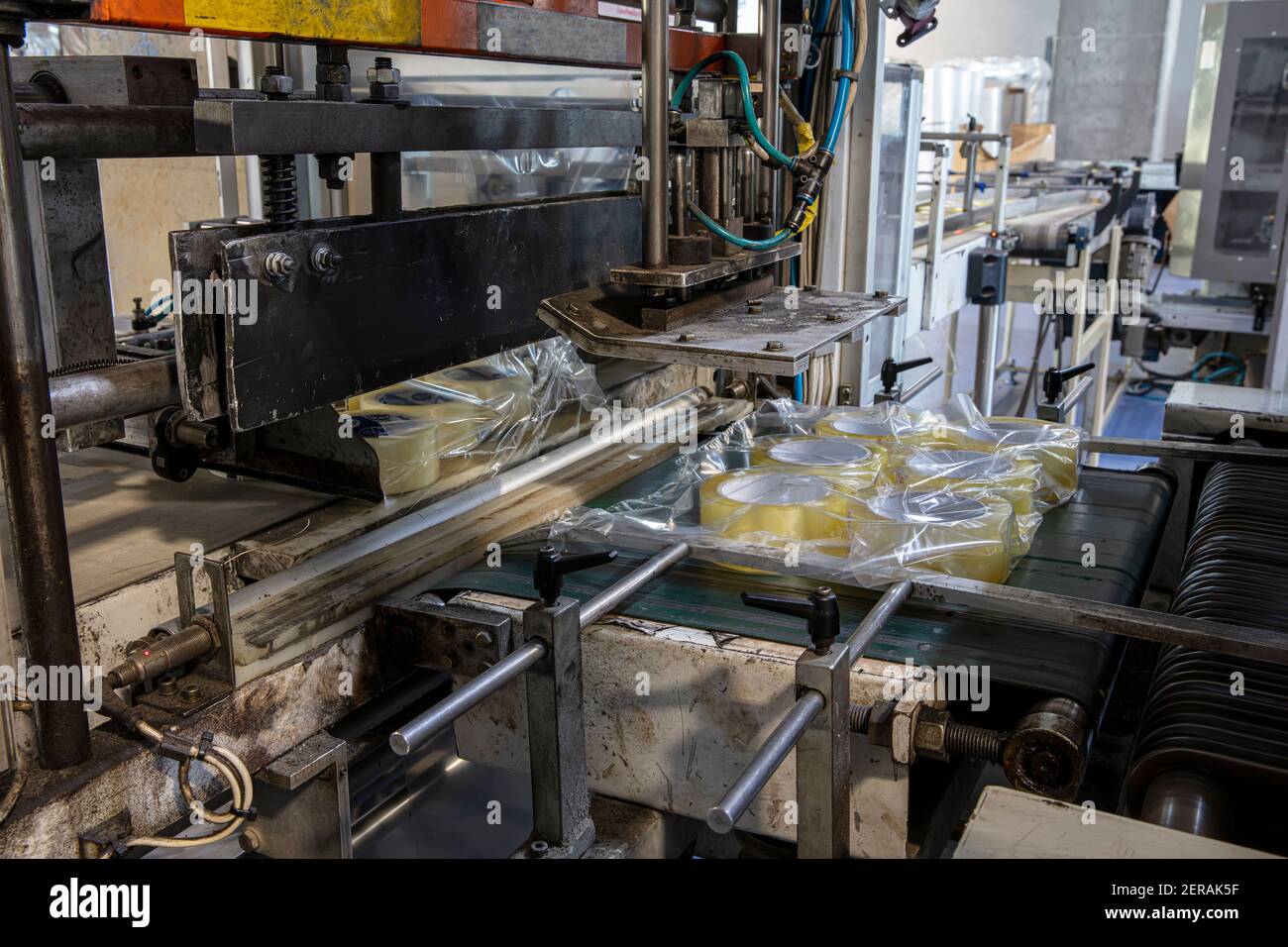 Packing tape factory. Production of duct tape. Strapping Machine for ...