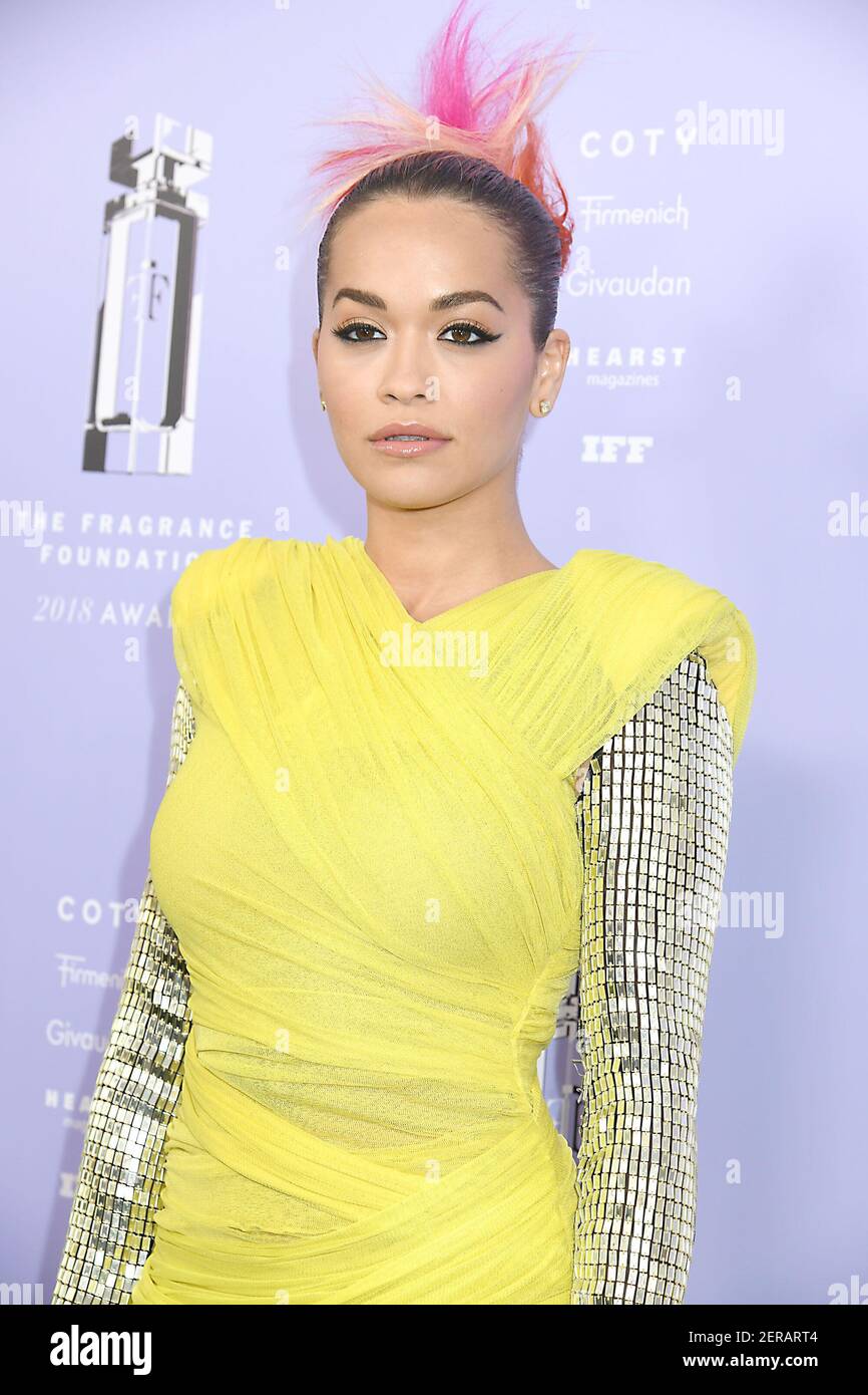 Rita Ora in Tom Ford yellow dress attends The 2018 Frangrance ...