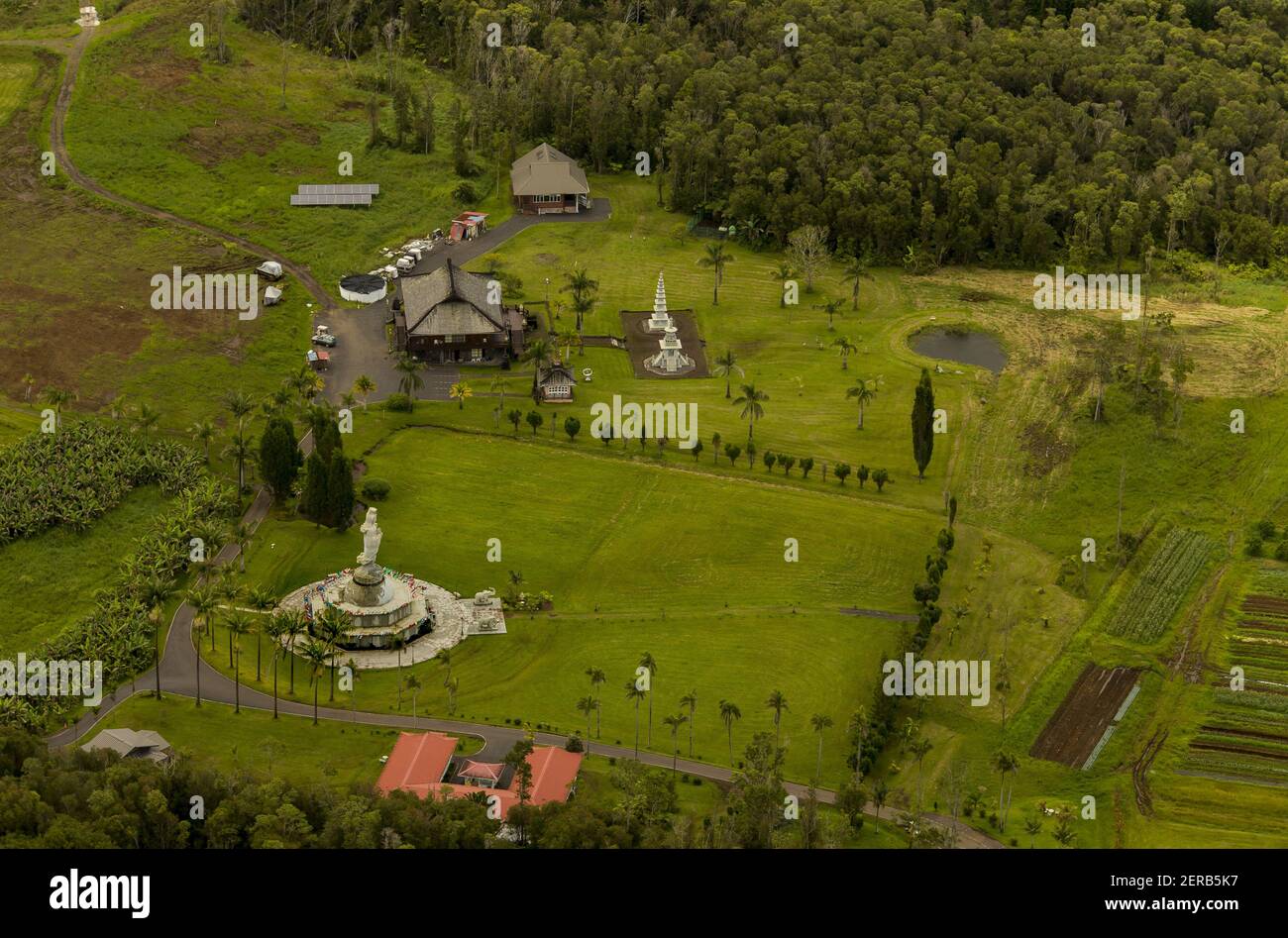 The grounds of a Buddhist temple outside Pahoa are untouched as the lower east rift zone ...