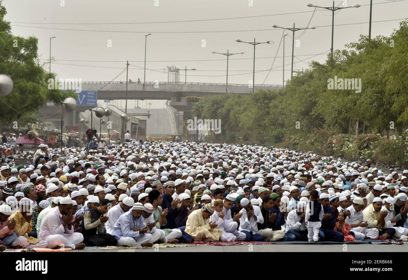 NEW DELHI, INDIA - JUNE 16: Muslim People greets each other after ...