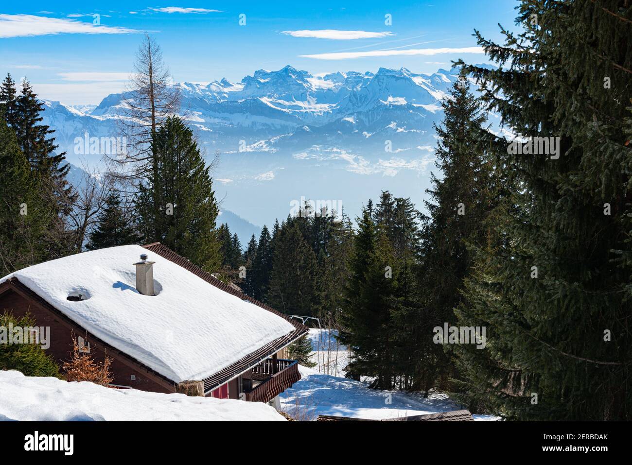 Unique panoramic alpine skyline view of Rigi resort. Snowed Chalets ...