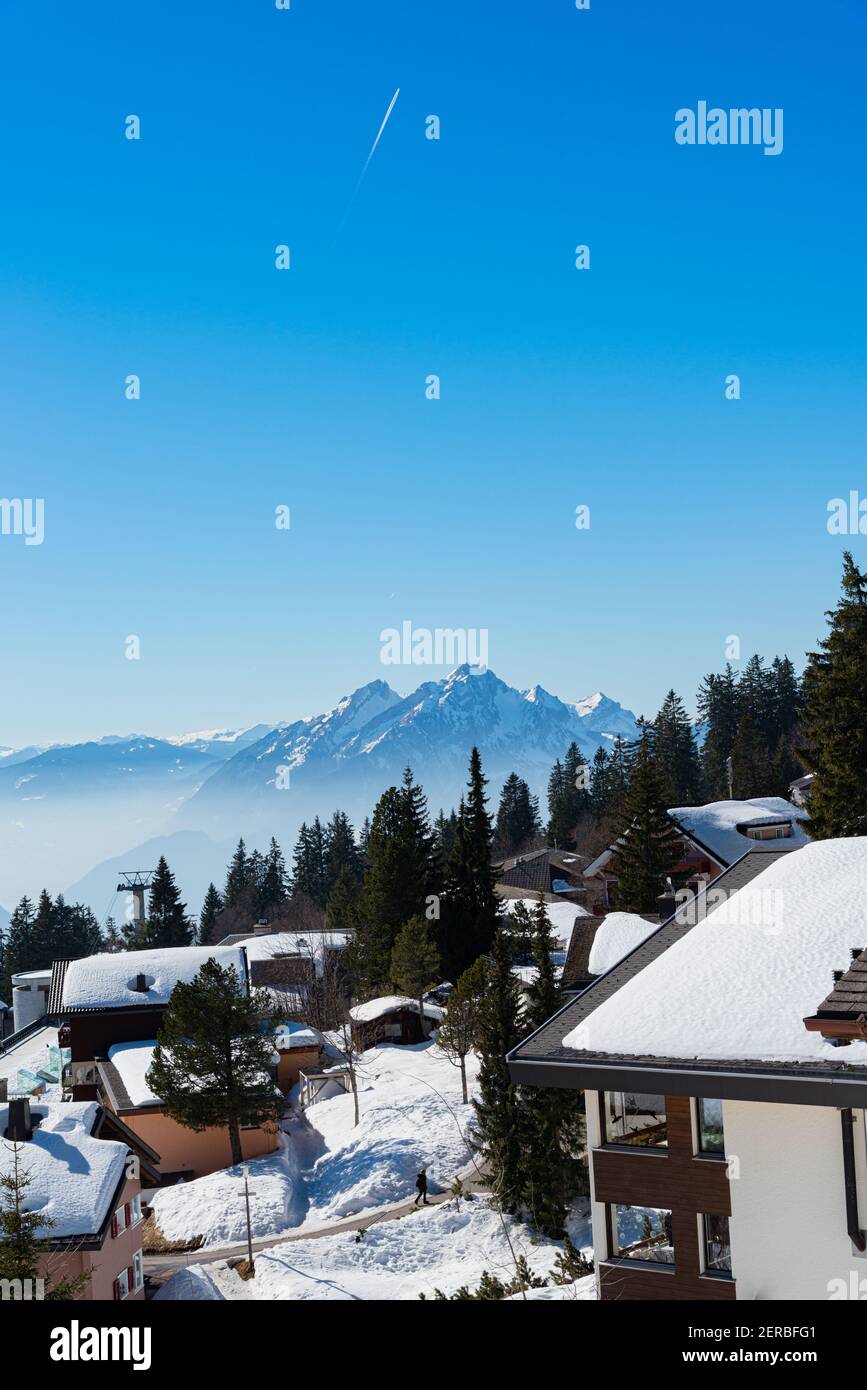 Unique panoramic alpine skyline view of Rigi resort. Snowed Chalets ...