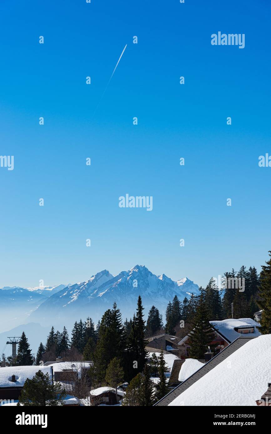 Unique panoramic alpine skyline view of Rigi resort. Snowed Chalets ...