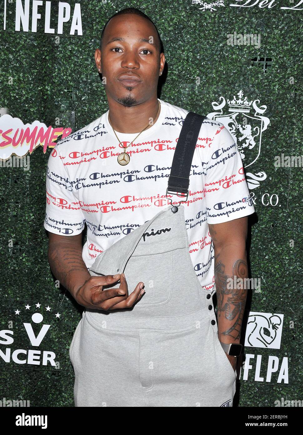 Kris D. Lofton arrives at the First Day of Summer x Athletes vs. Cancer ...