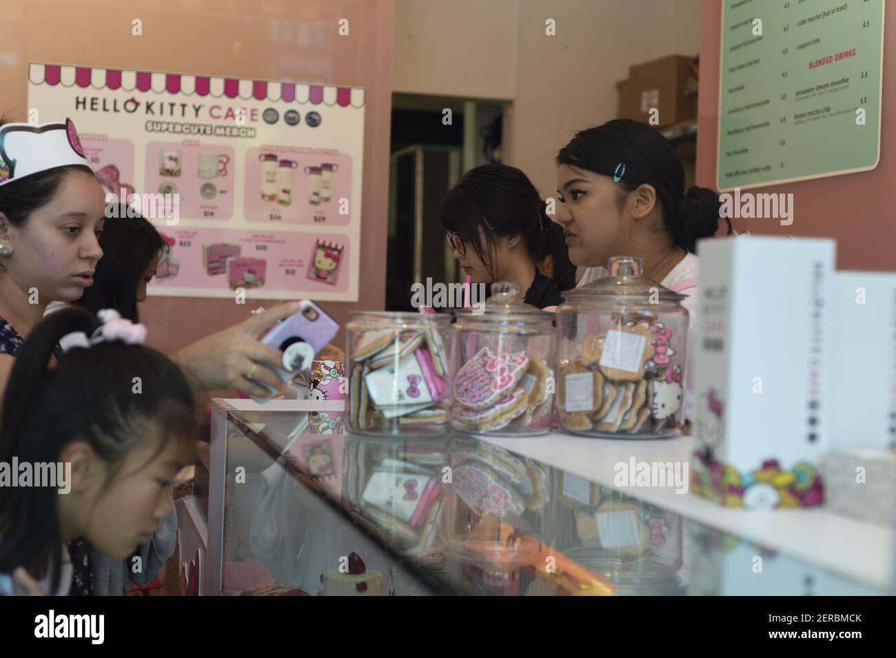 Loyal fans of Hello Kitty character wait in line for hours to purchase ...