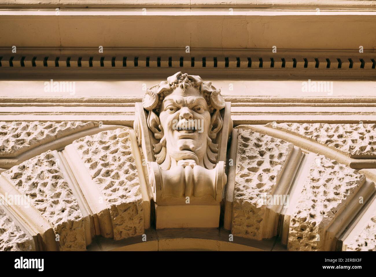 A bas-relief on the facade in the form of a human face Stock Photo - Alamy
