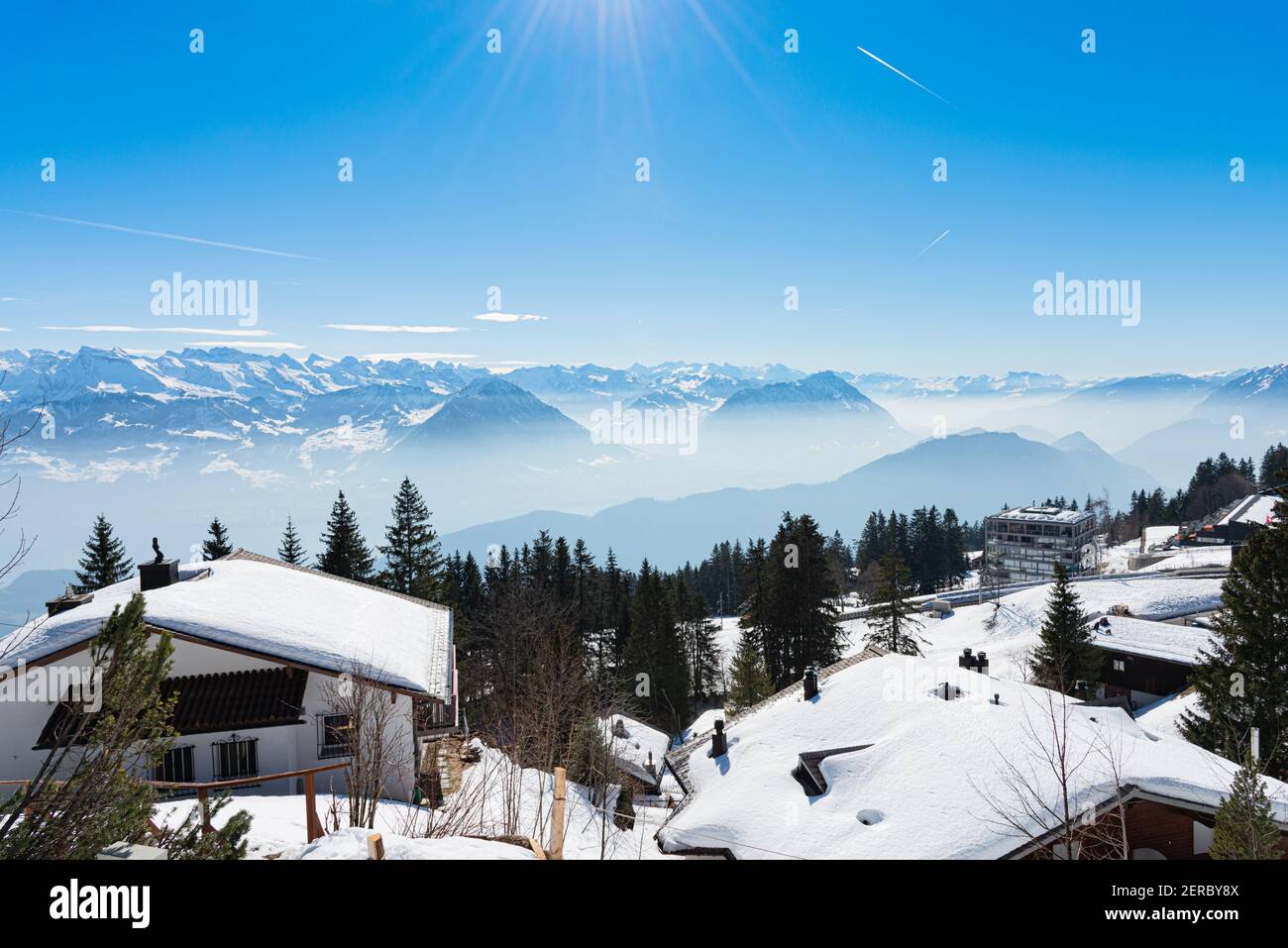 Unique panoramic alpine skyline view of Rigi resort. Snowed Chalets ...