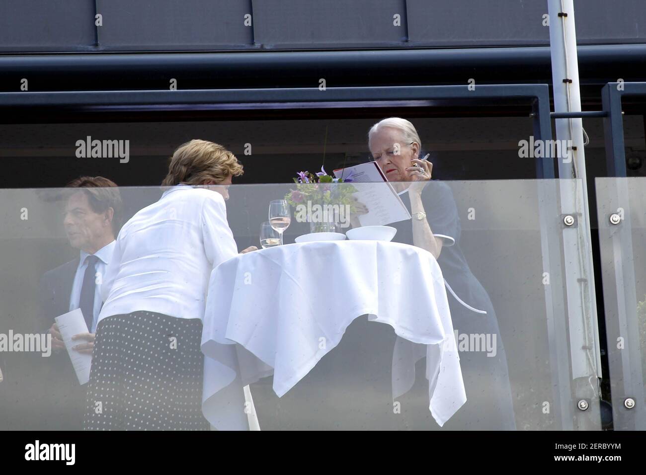 Queen Margrethe, with and Queen Anne-Marie, smoking a cigarette on the ...