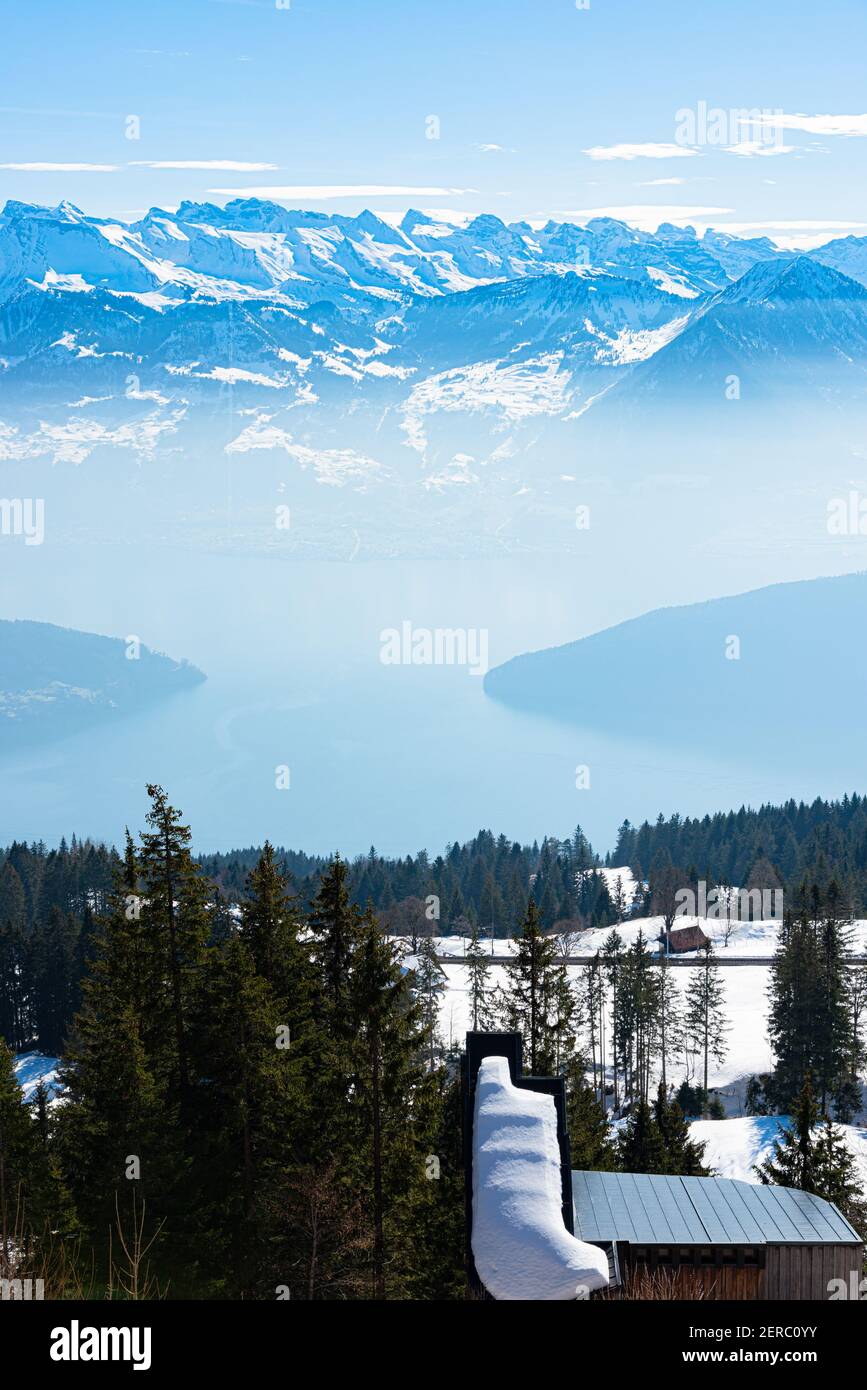 Unique panoramic alpine skyline view of Rigi resort. Snowed Chalets ...