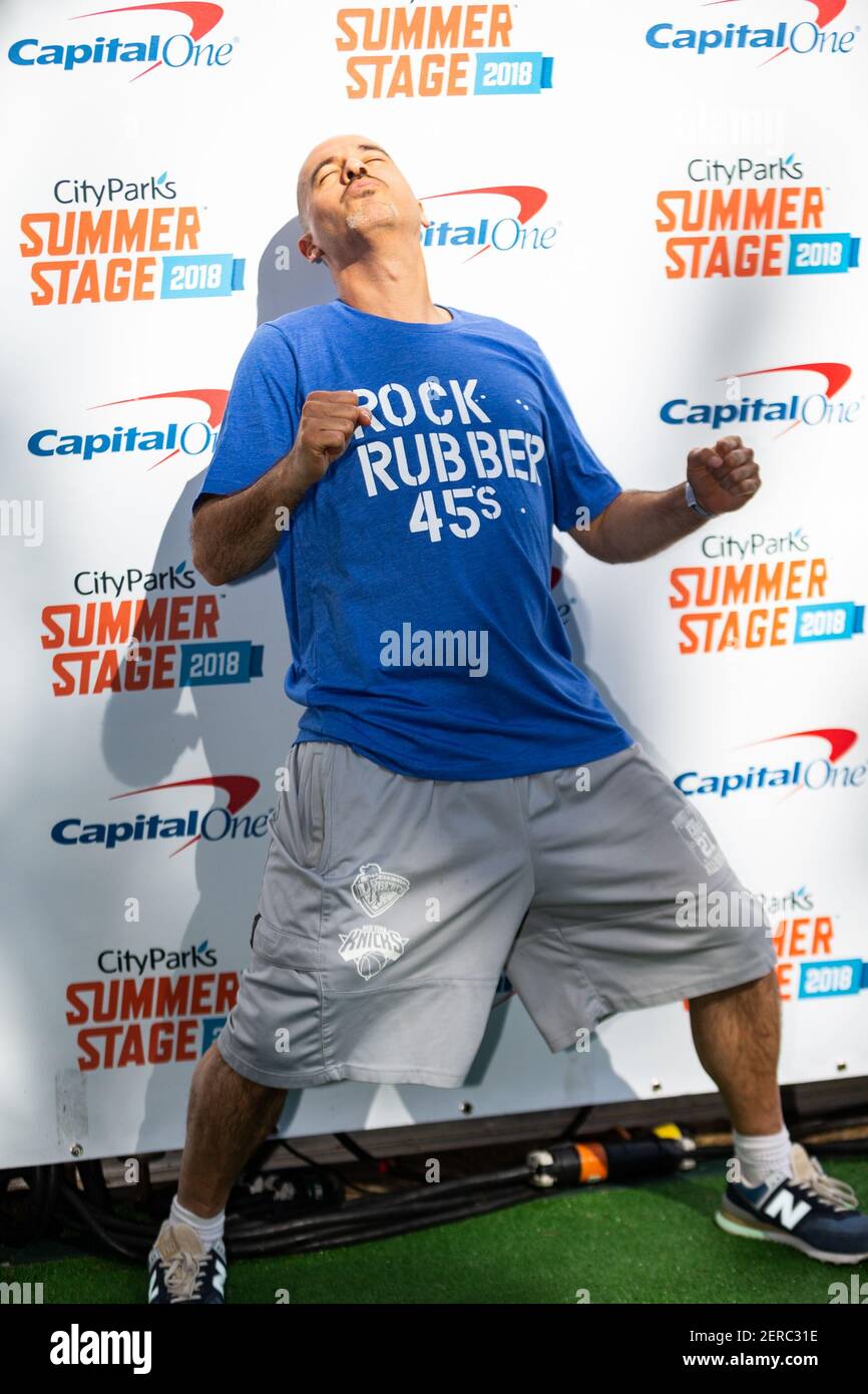DJ Bobbito Garcia is posing on red carper during "Rock Rubber 45s" NYC ...