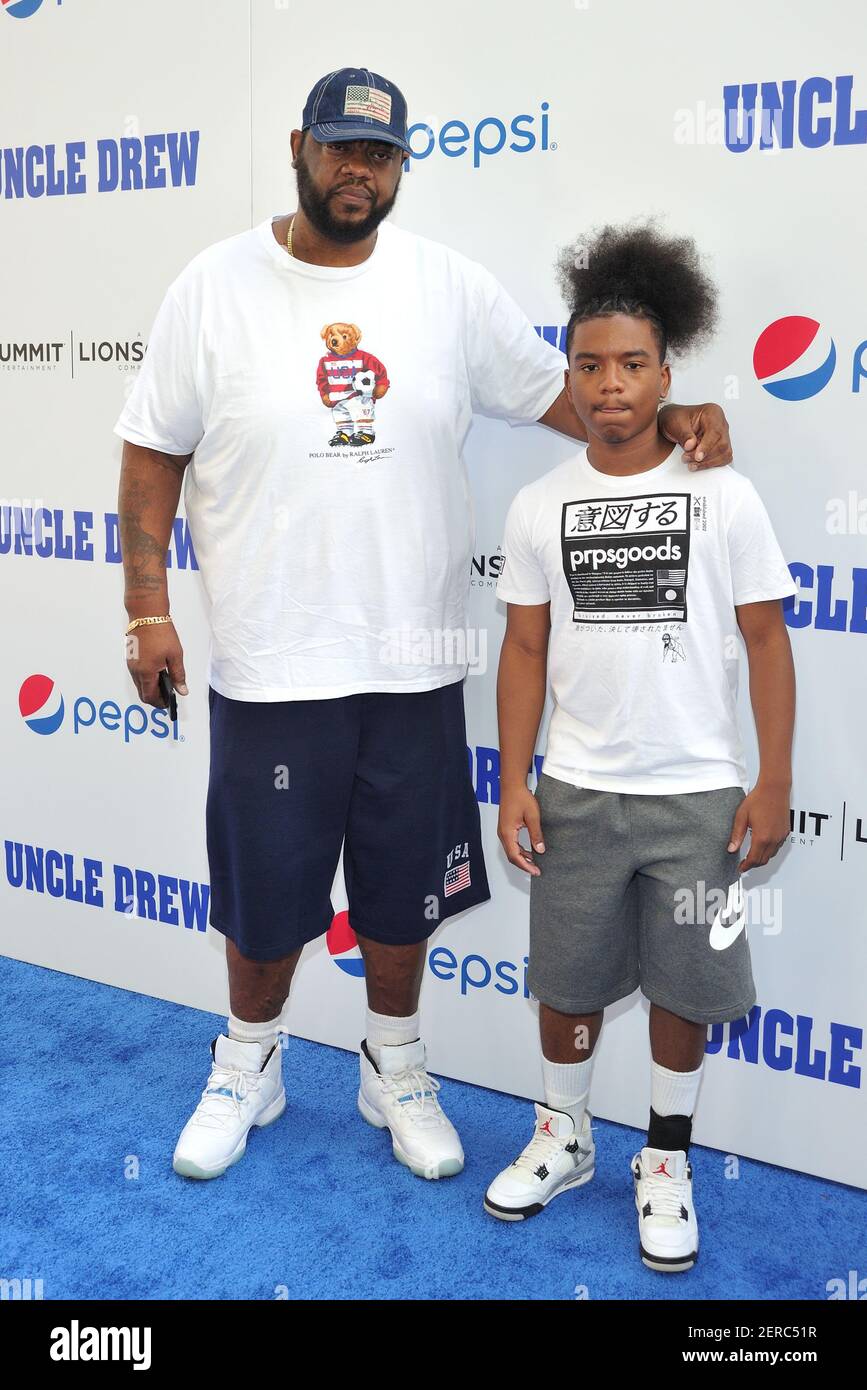 L-R: Actor Grizz Chapman and Christian Chapman attend the world ...
