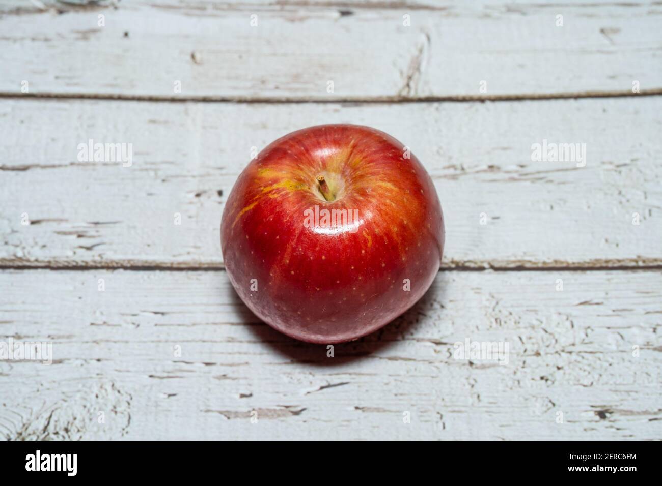 Apple is an edible fruit produced by an apple tree Stock Photo - Alamy