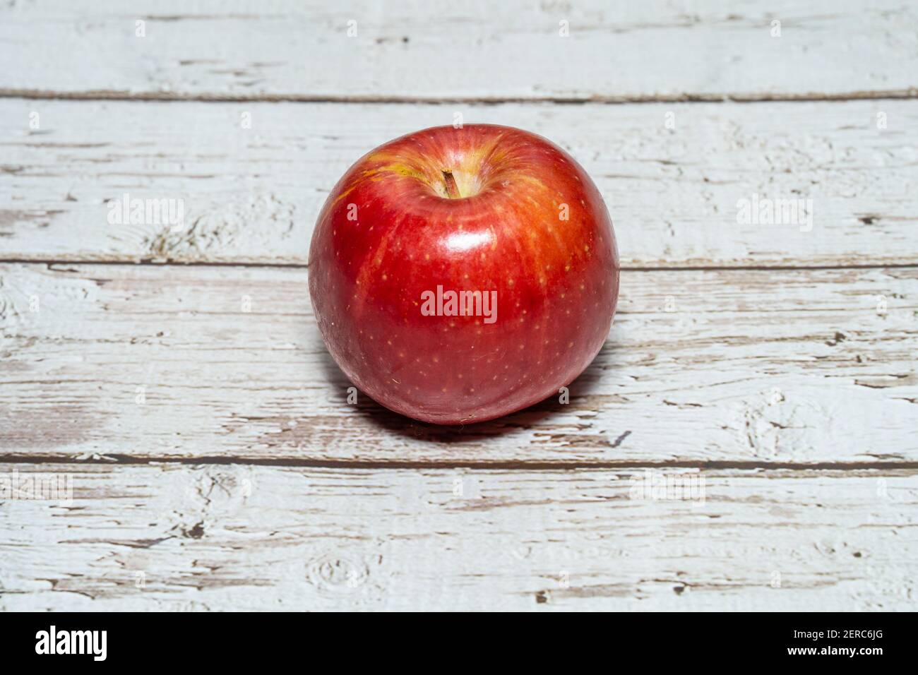 Apple is an edible fruit produced by an apple tree Stock Photo - Alamy