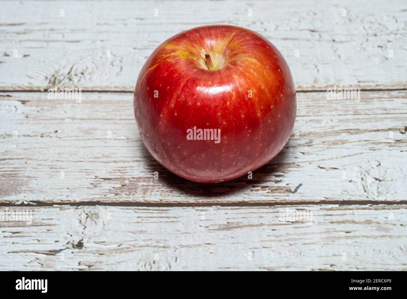 Apple is an edible fruit produced by an apple tree Stock Photo - Alamy
