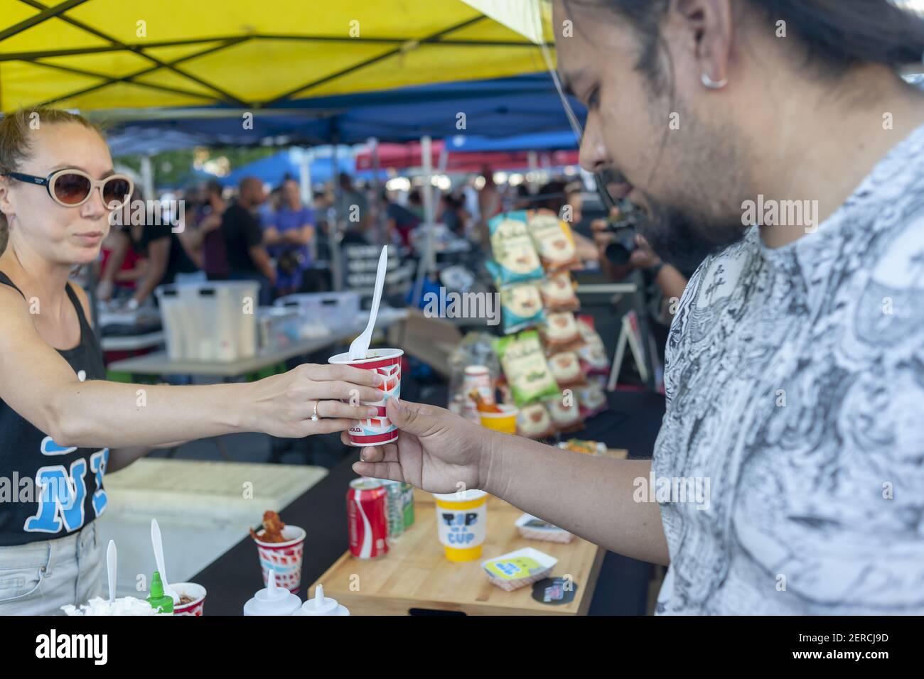 â€œRib in a Cupâ€ booth during the opening evening of the Bronx Night ...