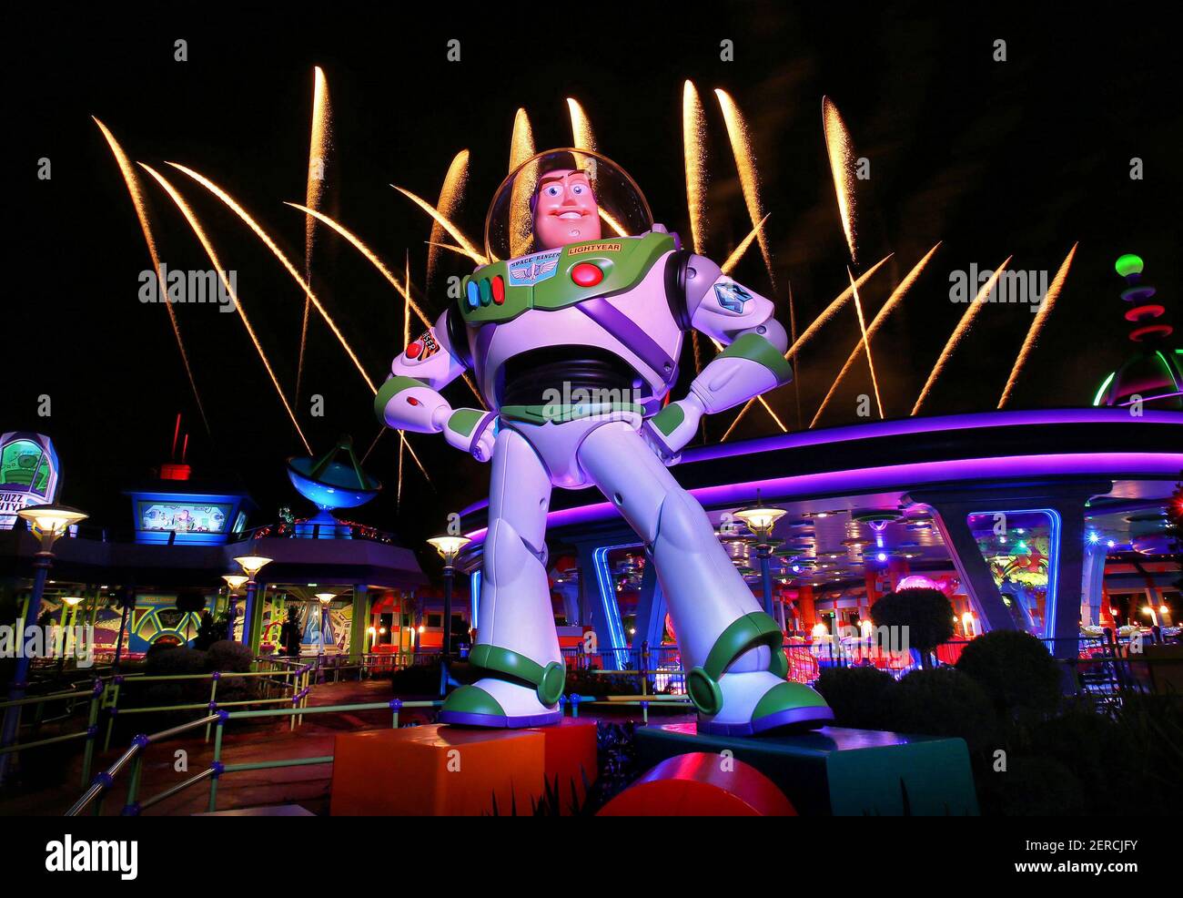 Fireworks launch behind a giant statue of the Buzz Lightyear character at the new Toy Story Land ...