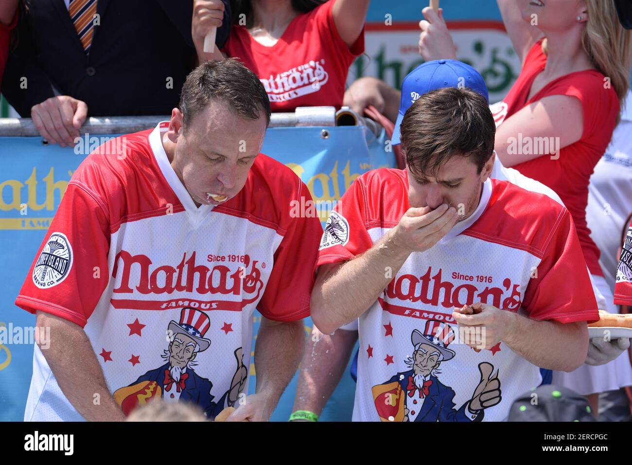 (L-R) American Competitive eaters Joey Chestnut and Carmen Cincotti ...
