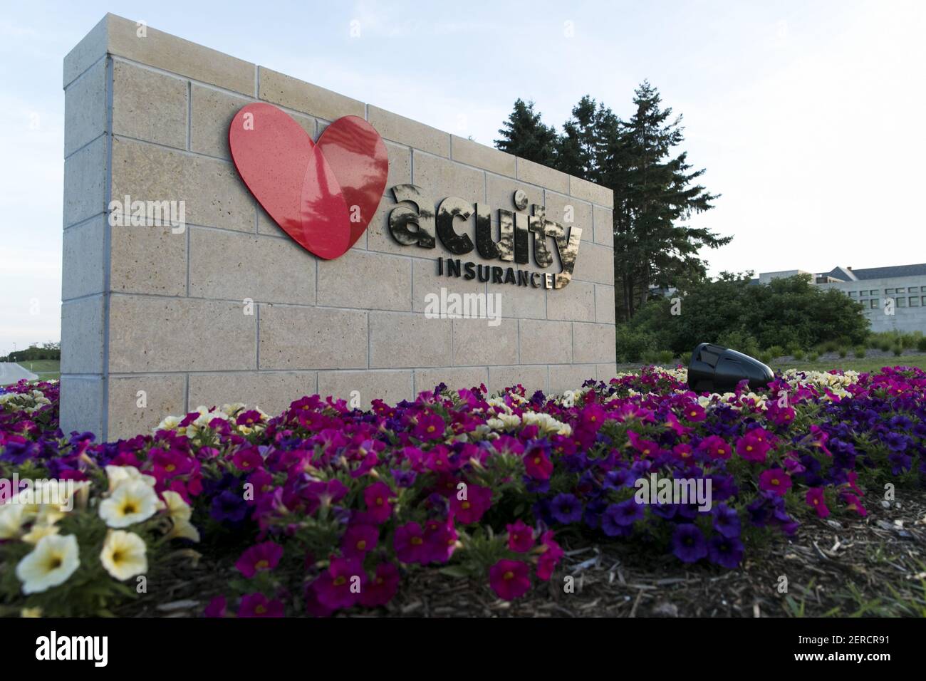 A logo sign outside of the headquarters of Acuity Insurance in ...