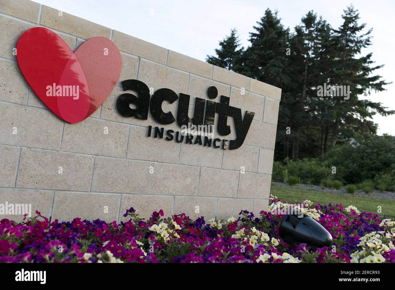 A logo sign outside of the headquarters of Acuity Insurance in ...